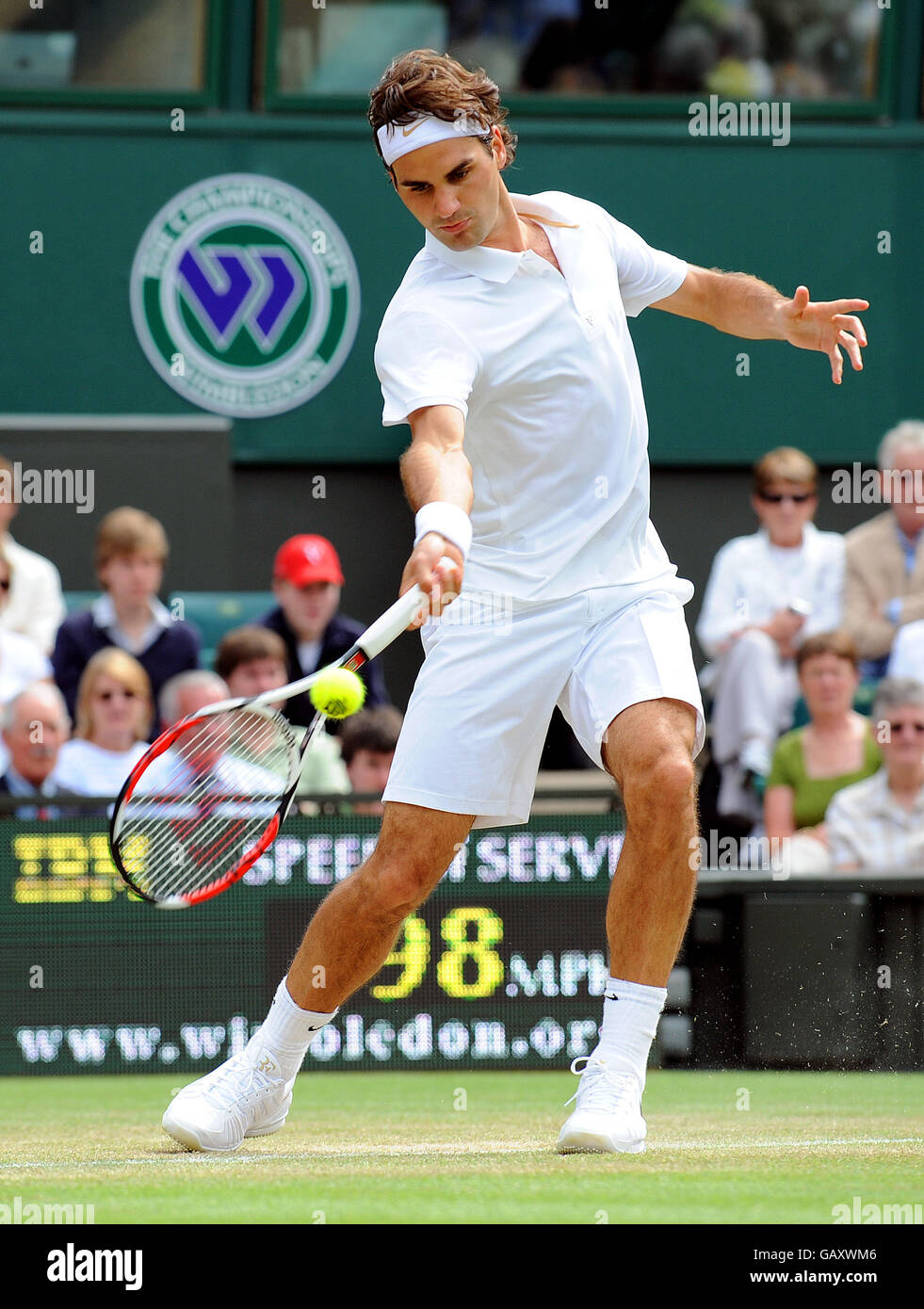 Switzerland's Roger Federer in action against France's Marc Gicquel ...