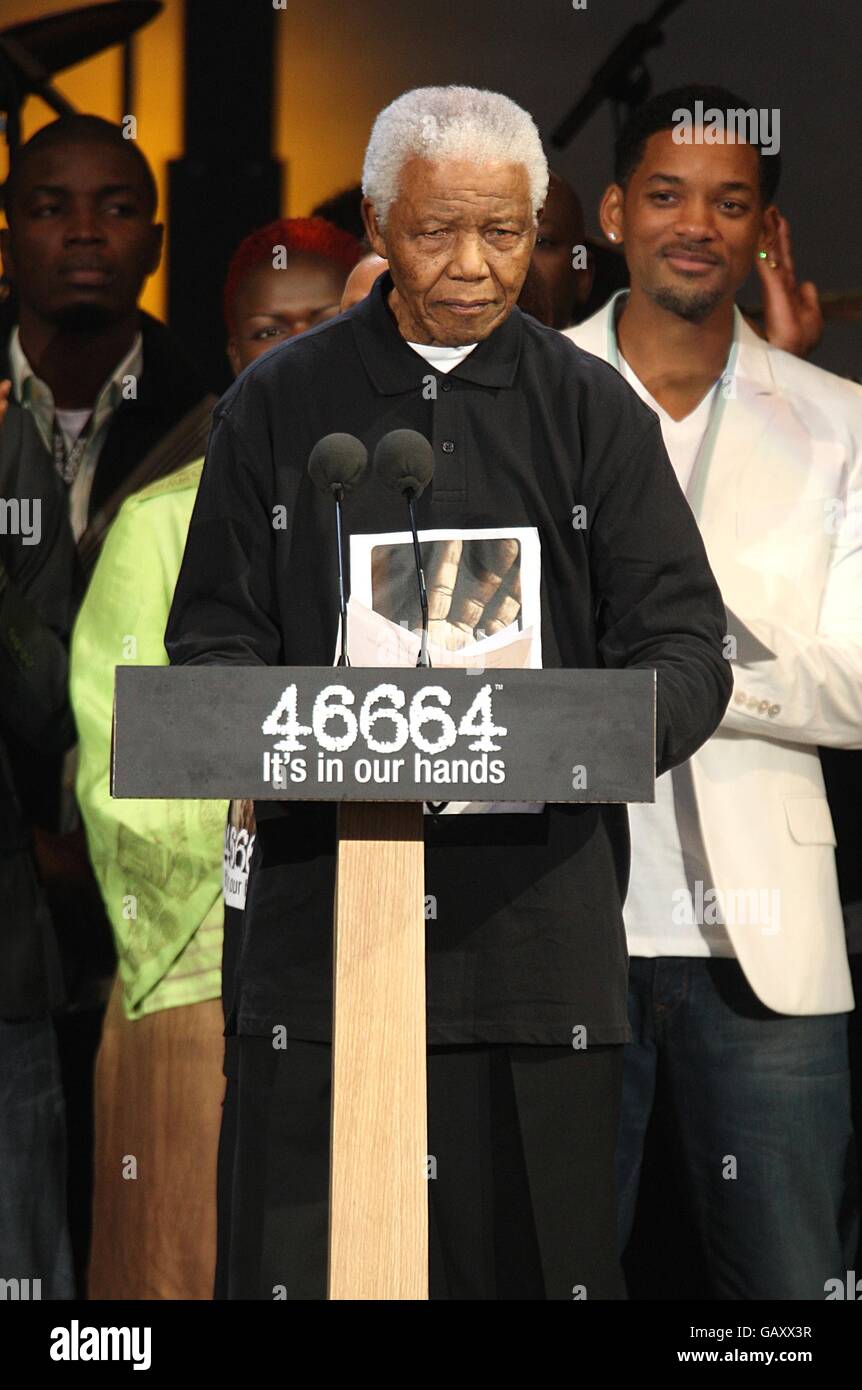 Nelson Mandela is joined on stage by his guests during the 46664 ...