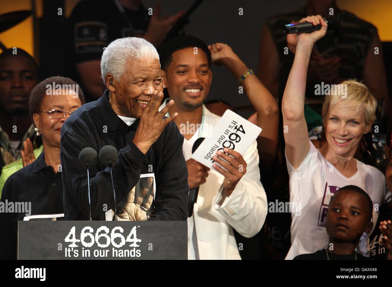 Nelson Mandela is joined on stage by his guests during the 46664 ...