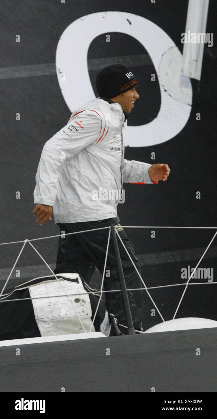 British Formula 1 driver Lewis Hamilton aboard the open 60 yacht Hugo ...