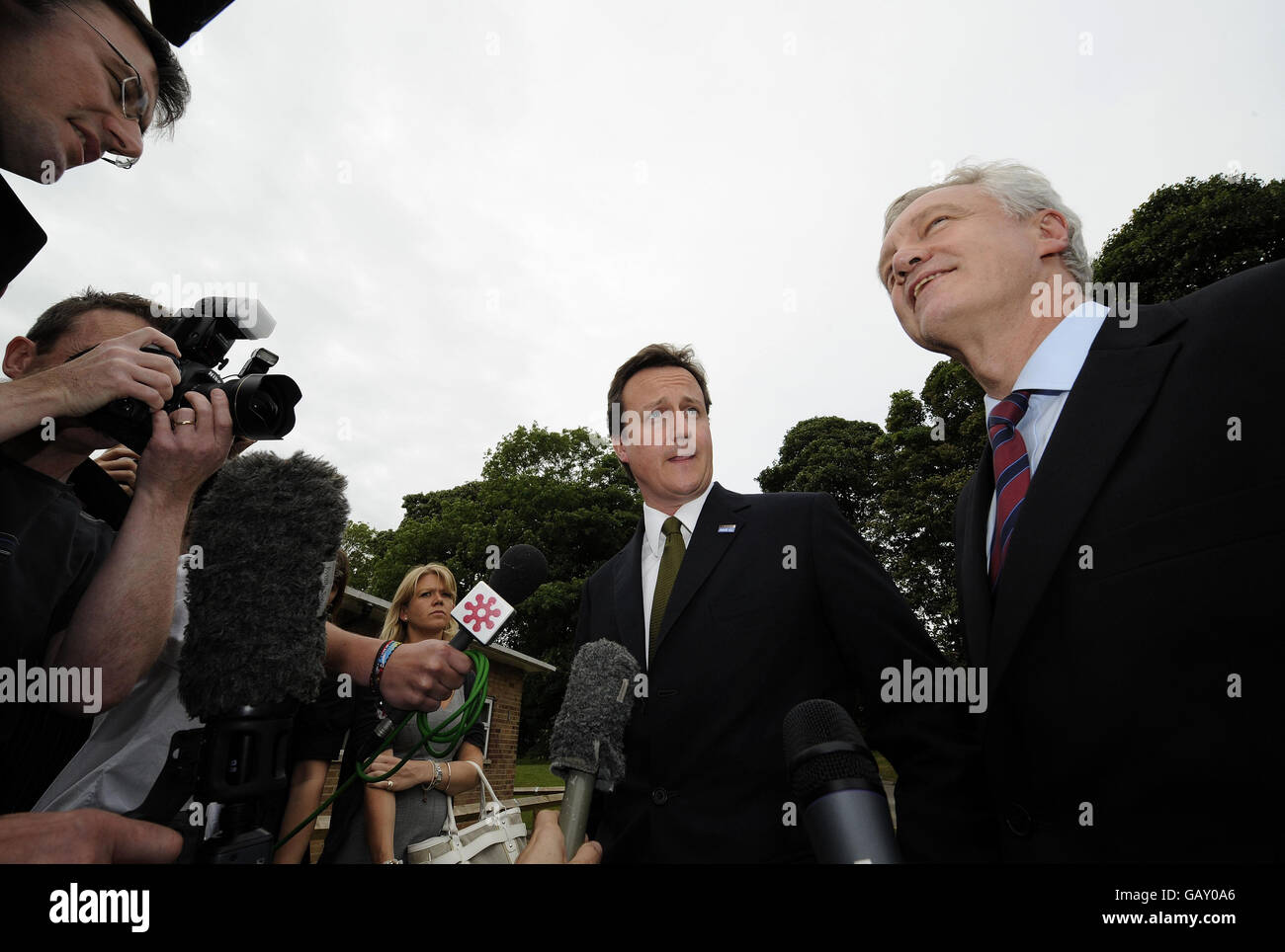 Conservative Party leader David Cameron (left) joins David Davis, the ...