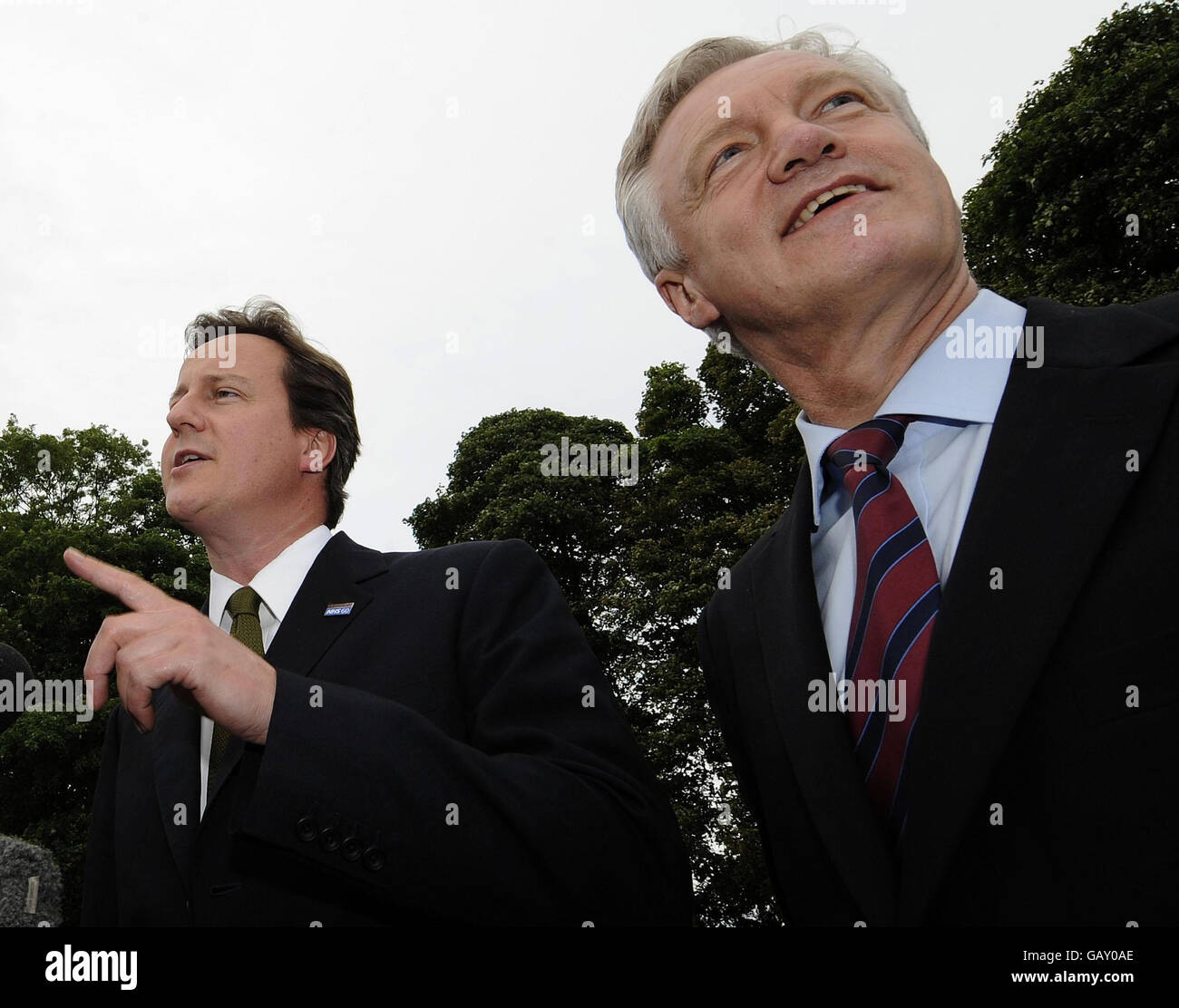 Conservative Party leader David Cameron (left) joins David Davis, the ...