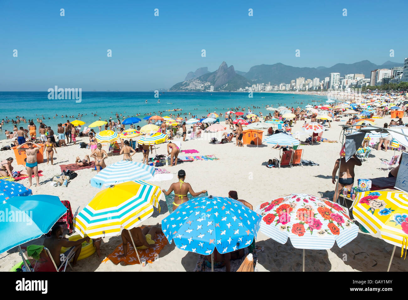 Beachgoers umbrellas on beach hi-res stock photography and images - Alamy