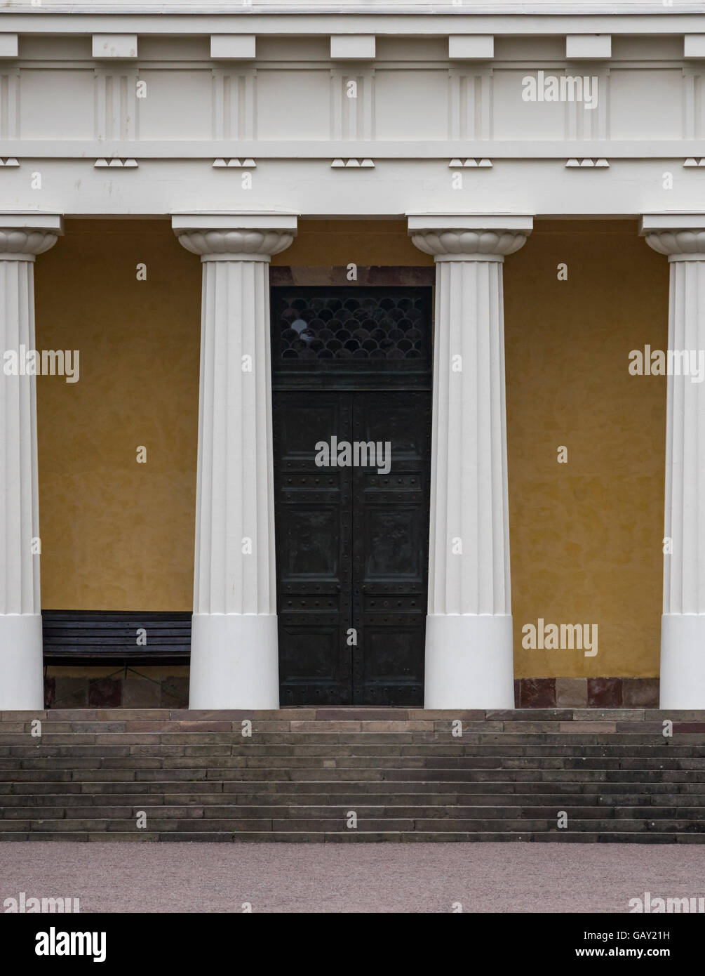Entrance with four Doric columns Stock Photo - Alamy