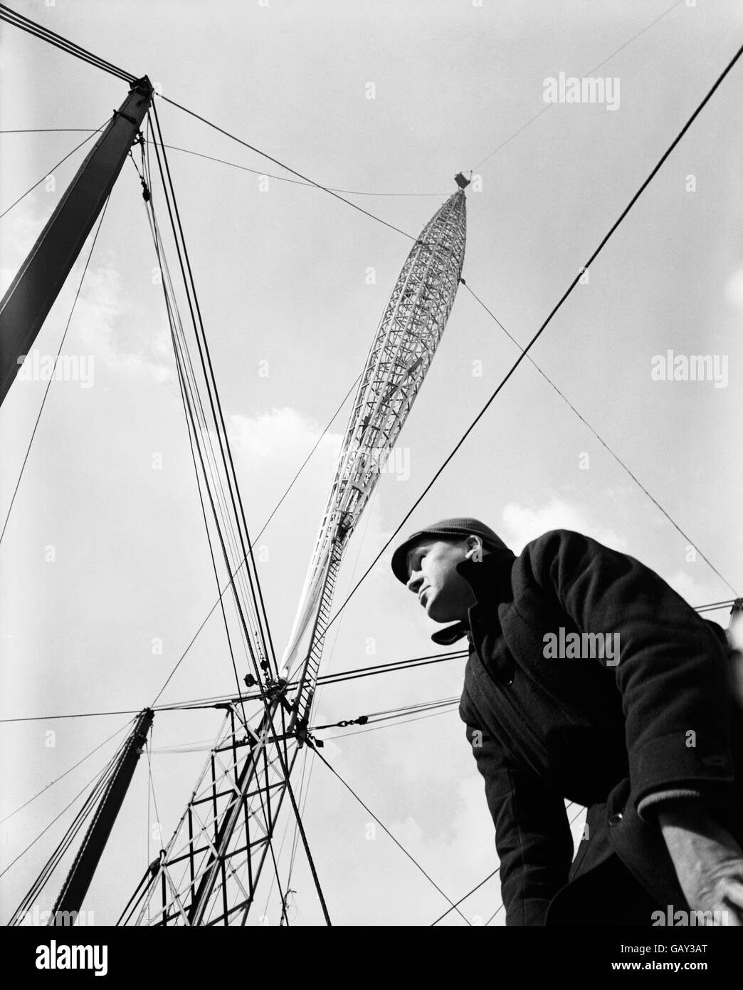 Electrician Ernie Rose in front of the nearly completed Skylon, feature ...
