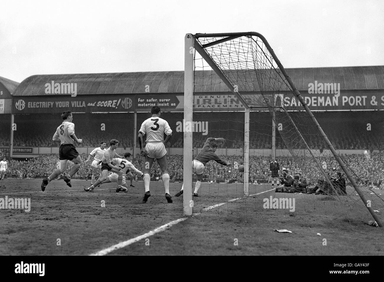 David Gaskell, Manchester United goalkeeper dives as a header from ...