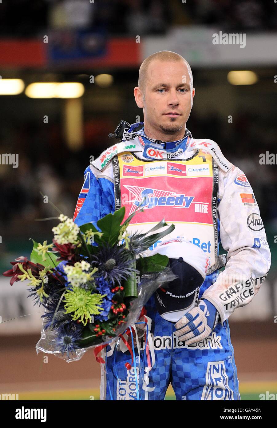 Denmark's Nicki Pedersen on the podium after his third place in the FIM ...
