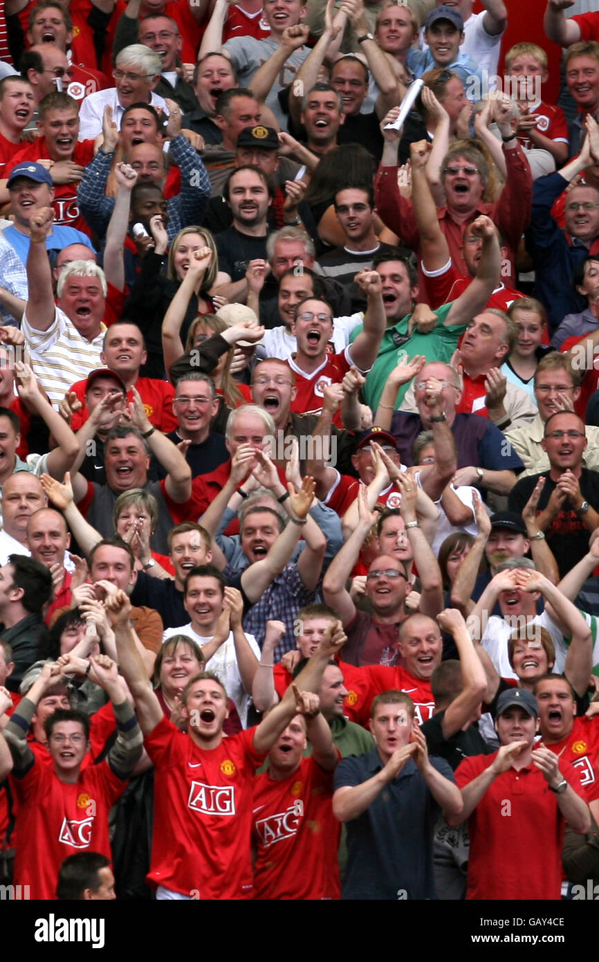 Manchester United fans celebrate the first goal from Luis Nani Stock ...