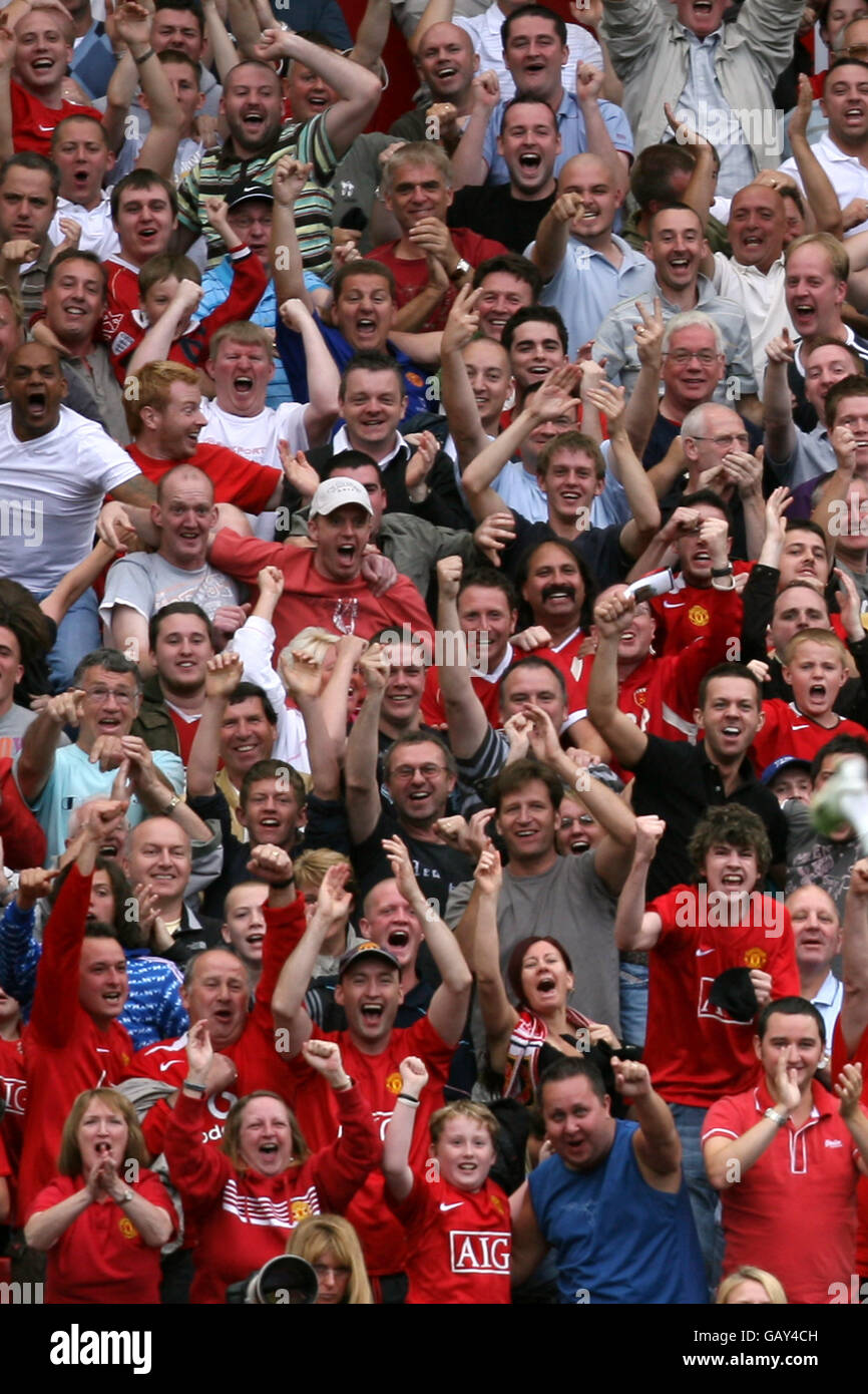 Manchester United fans celebrate the first goal from Luis Nani Stock ...