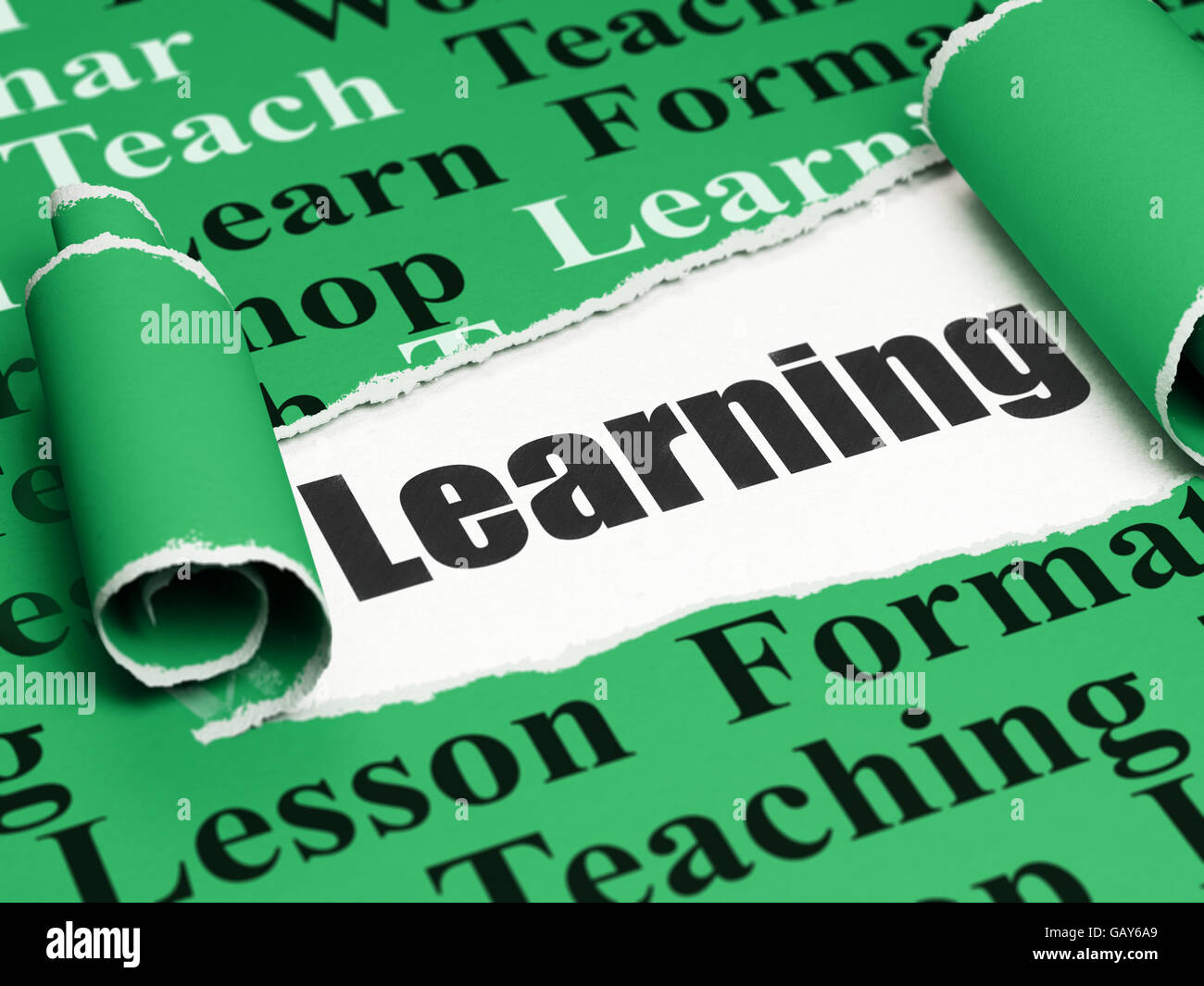 Education concept: black text Learning under the piece of torn paper ...