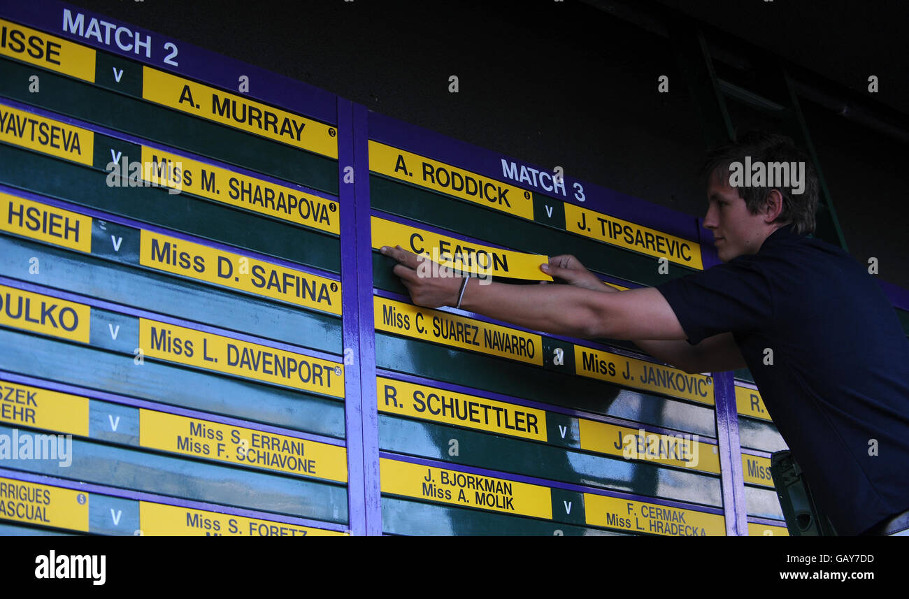 The draw board is updated during the Wimbledon Championships 2008 at ...