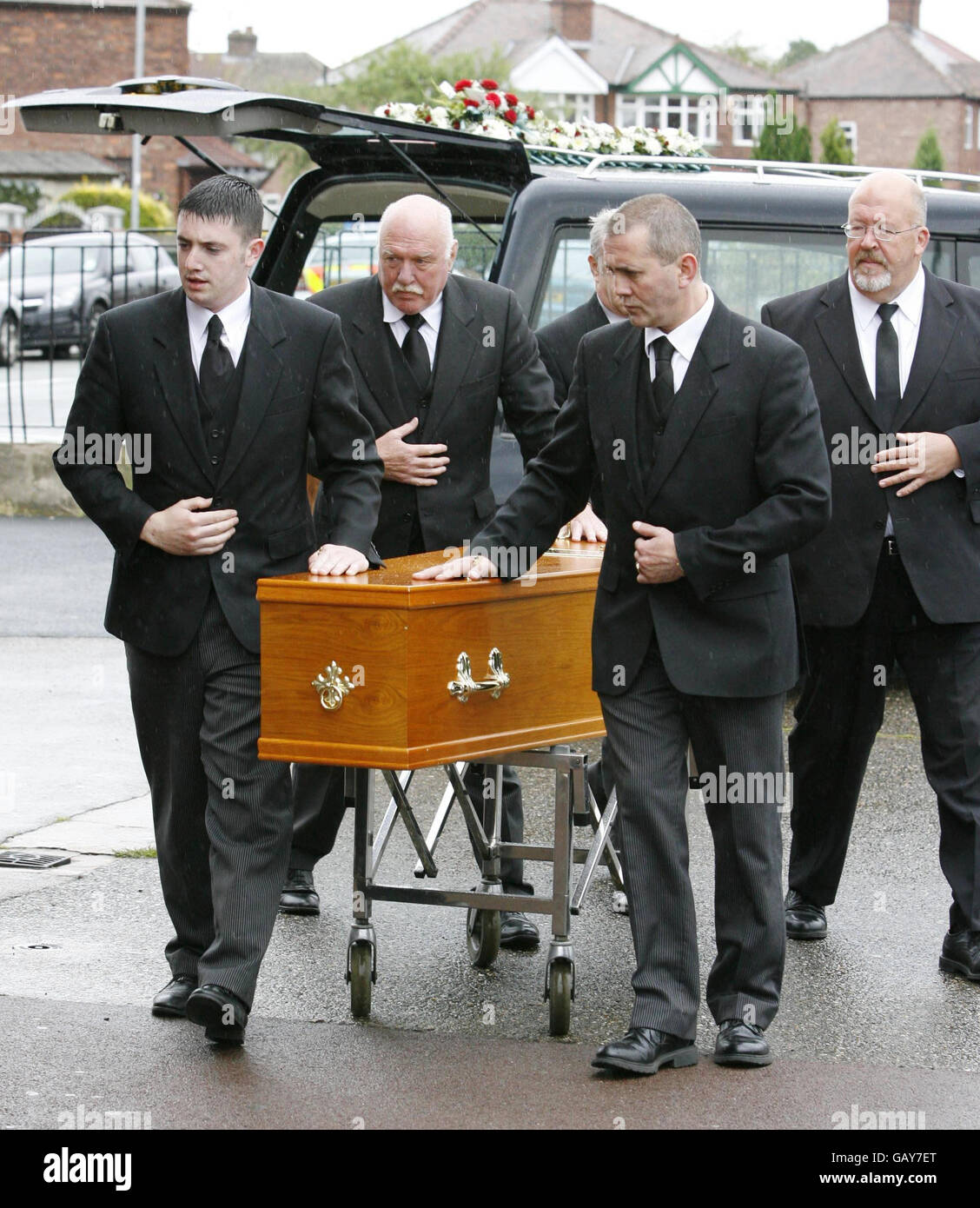 The coffin of Brian Philcox is taken into St Edwards Roman Catholic ...