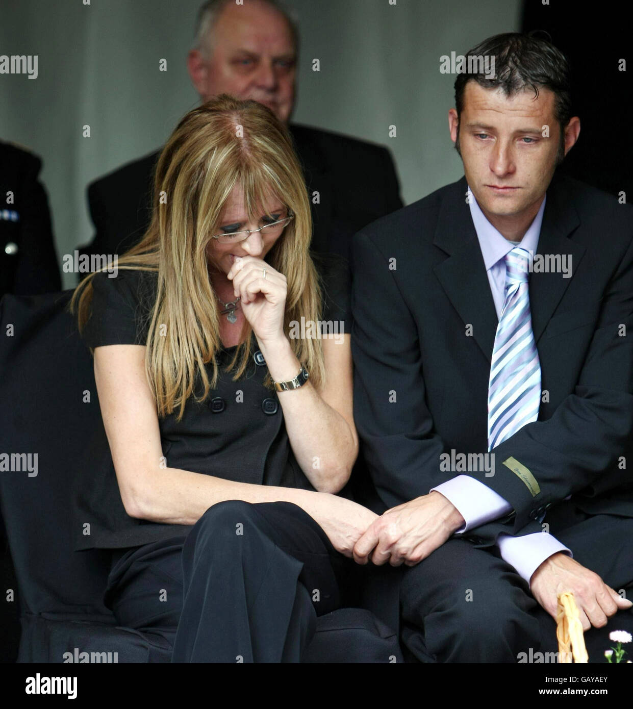Carol Swindells with friend Neil Tyers at the memorial to her husband ...