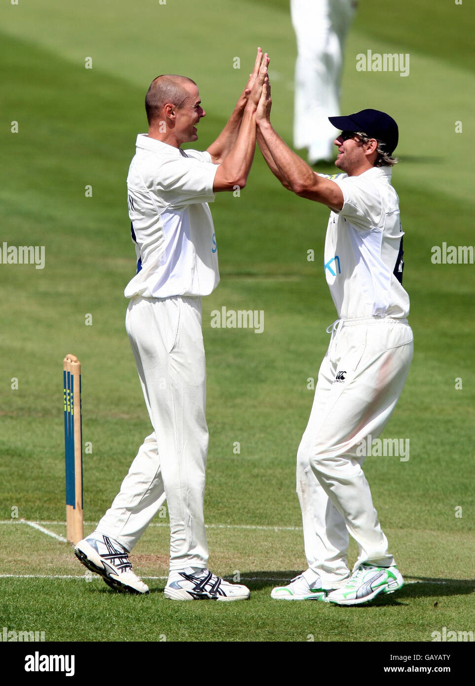 Full length celebrating high five head to head smiling happy england hi ...