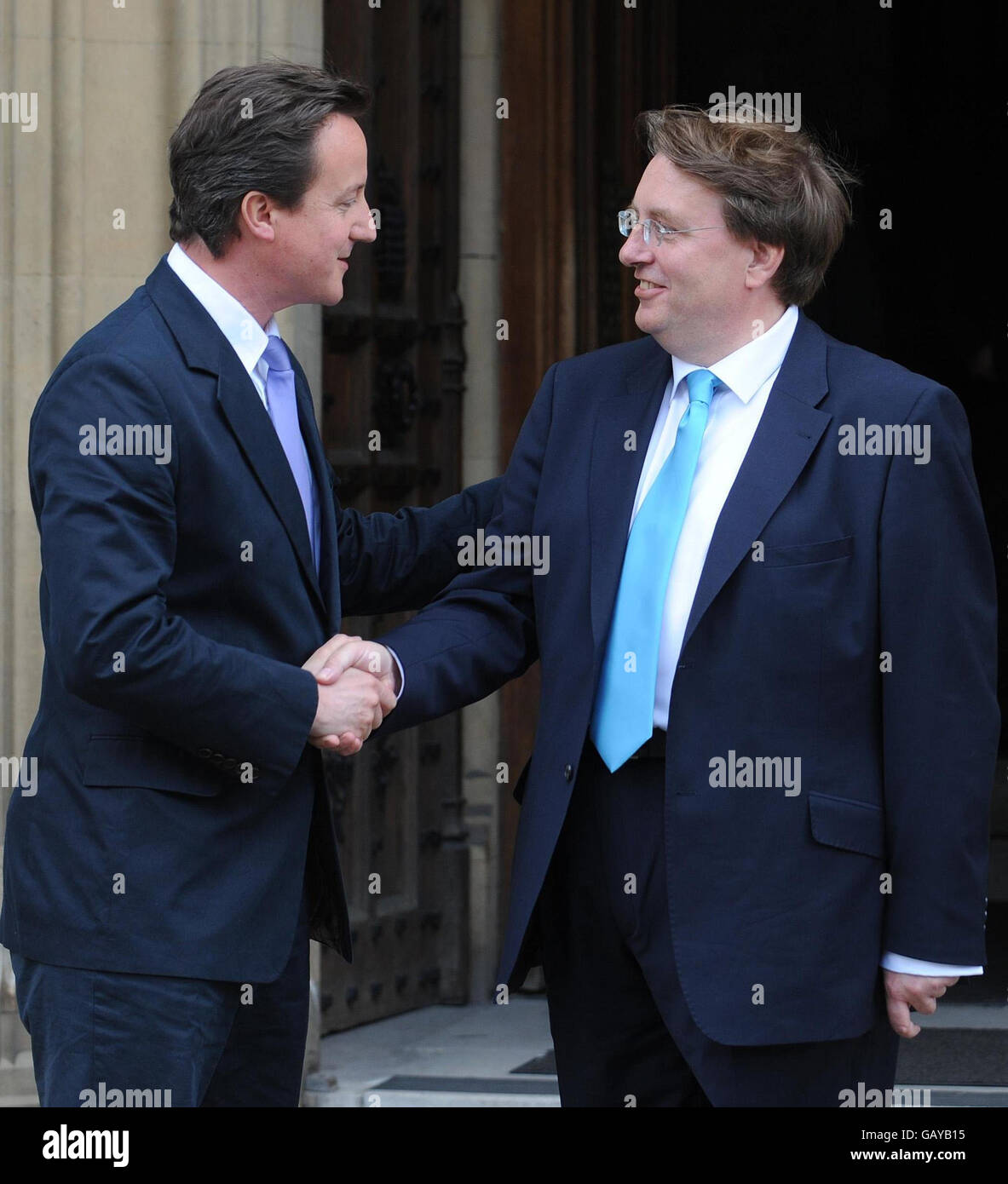 Conservative Party leader David Cameron (left) welcomes newly appointed ...