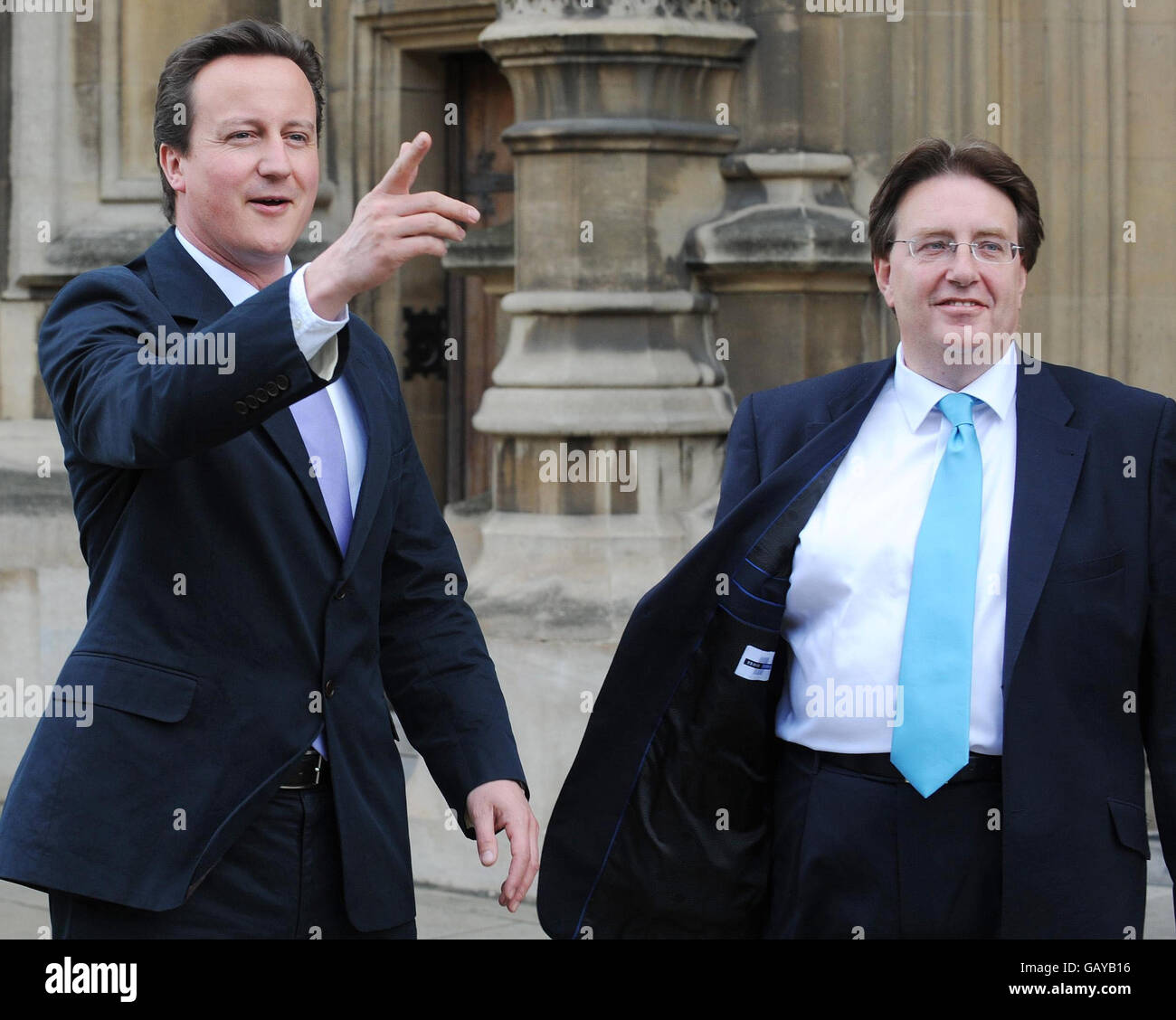 Conservative Party leader David Cameron (left) welcomes newly appointed ...