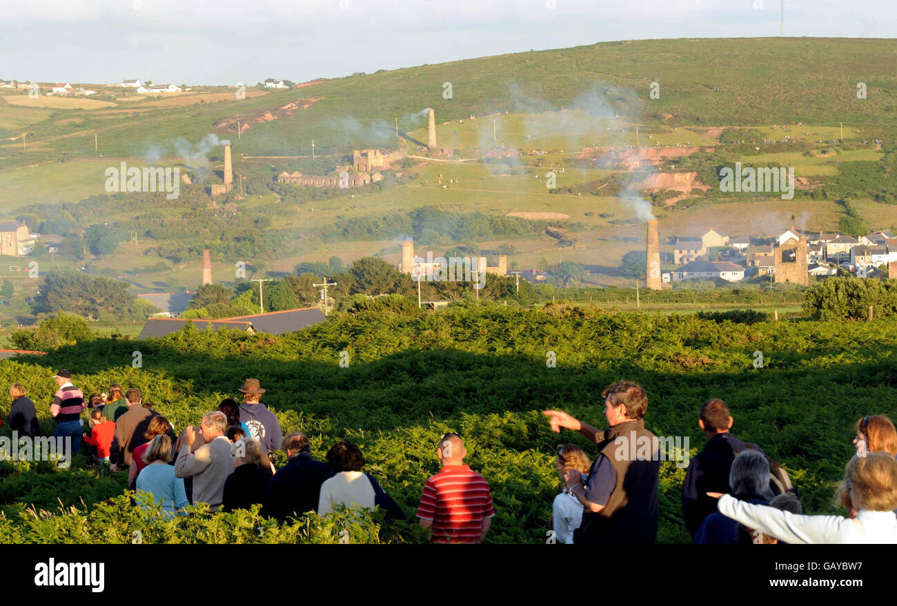 View of smoke rising from chimneys as seen from Carn Brae near Redruth ...