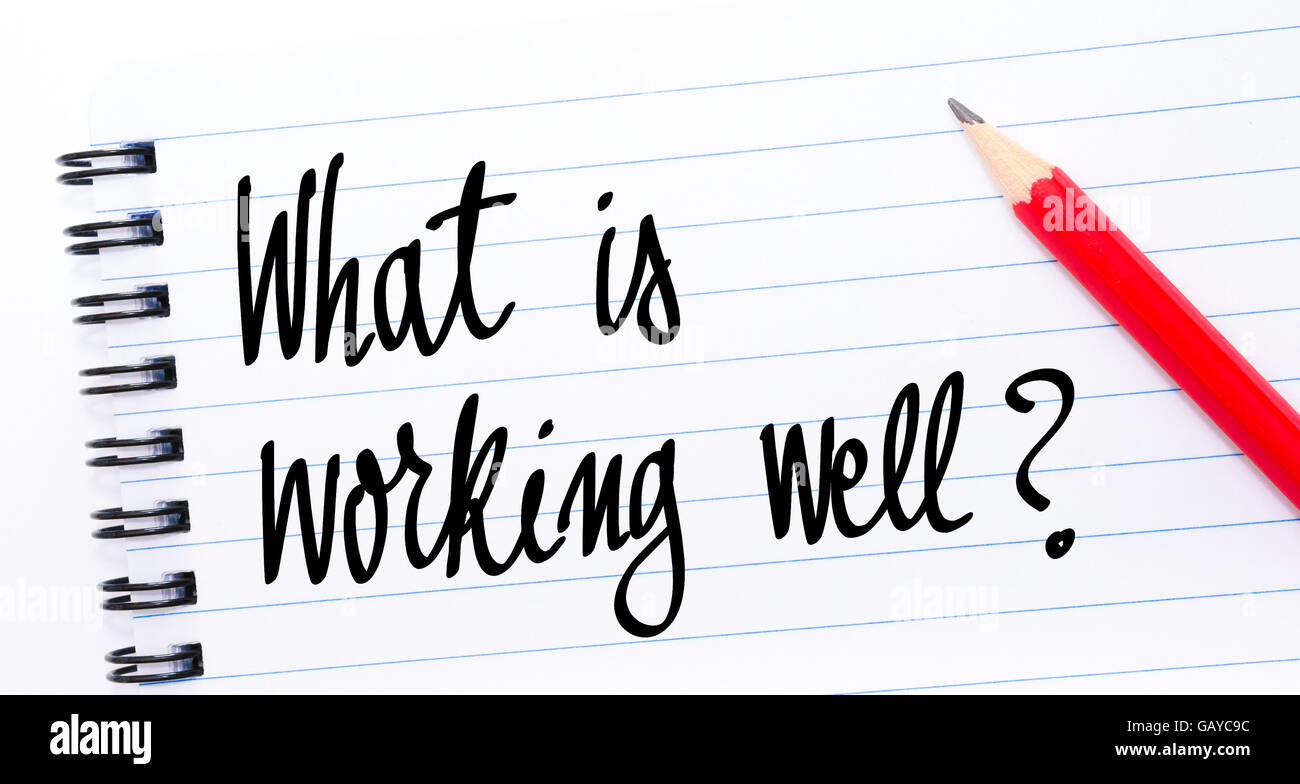 What Is Working Well ? written on notebook page with red pencil on the ...