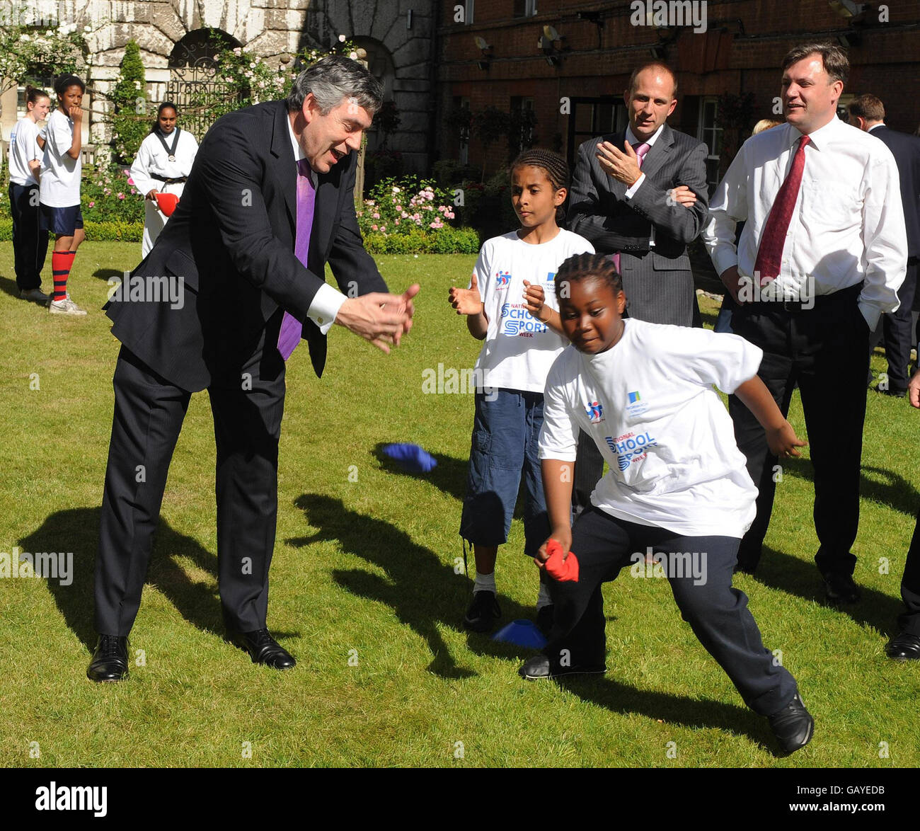 Prime Minister Gordon Brown takes part in a game of catch with children ...