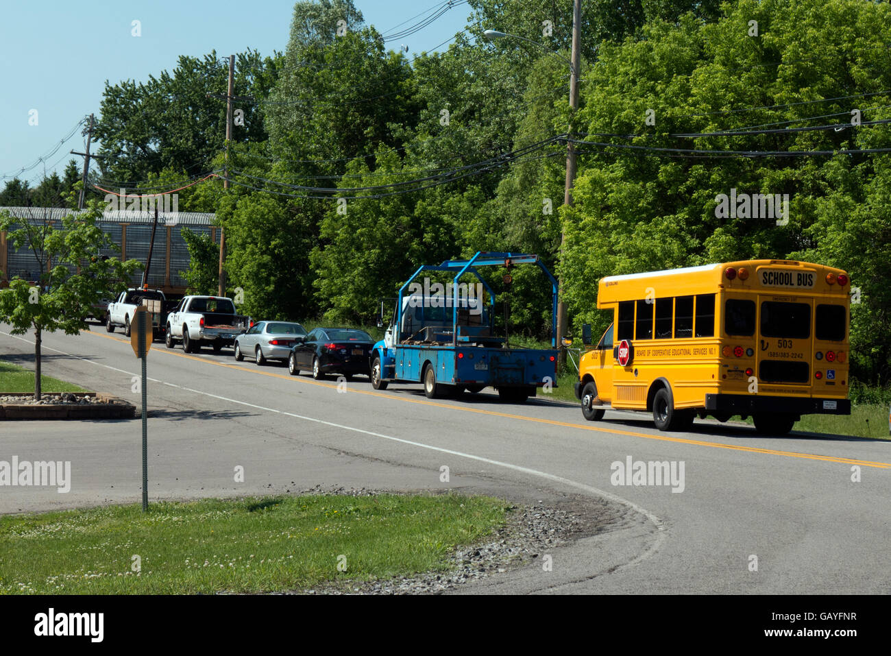School bus at railroad crossing Stock Photo - Alamy