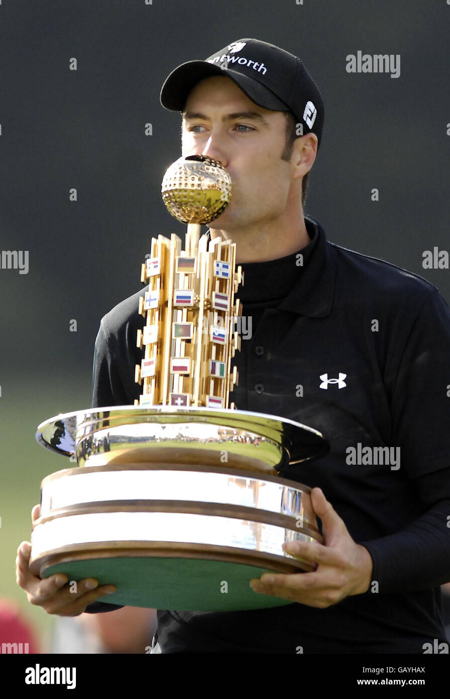 Ross Fisher kisses the trophy after winning the European Open European ...