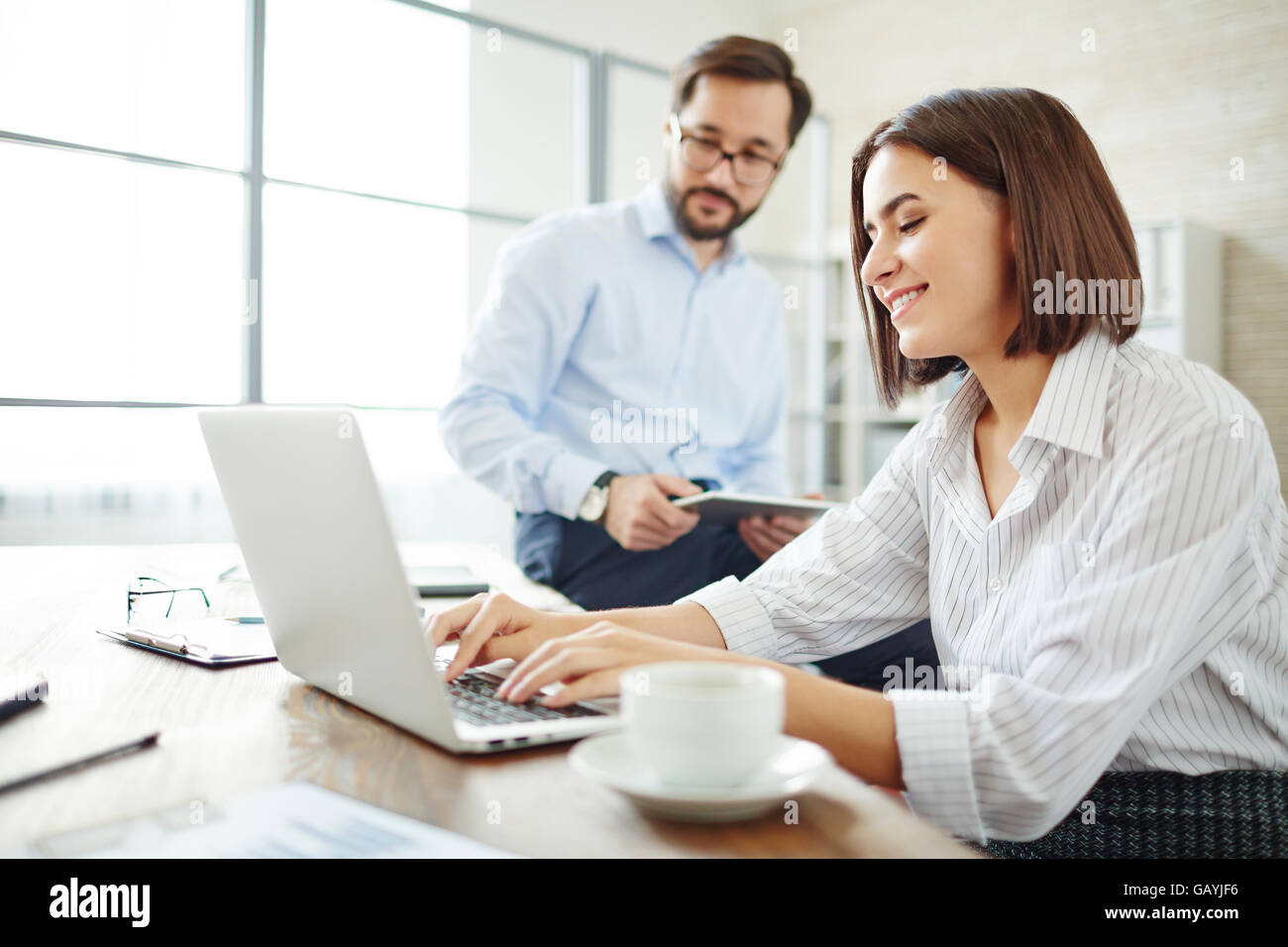 Secretary at work Stock Photo - Alamy