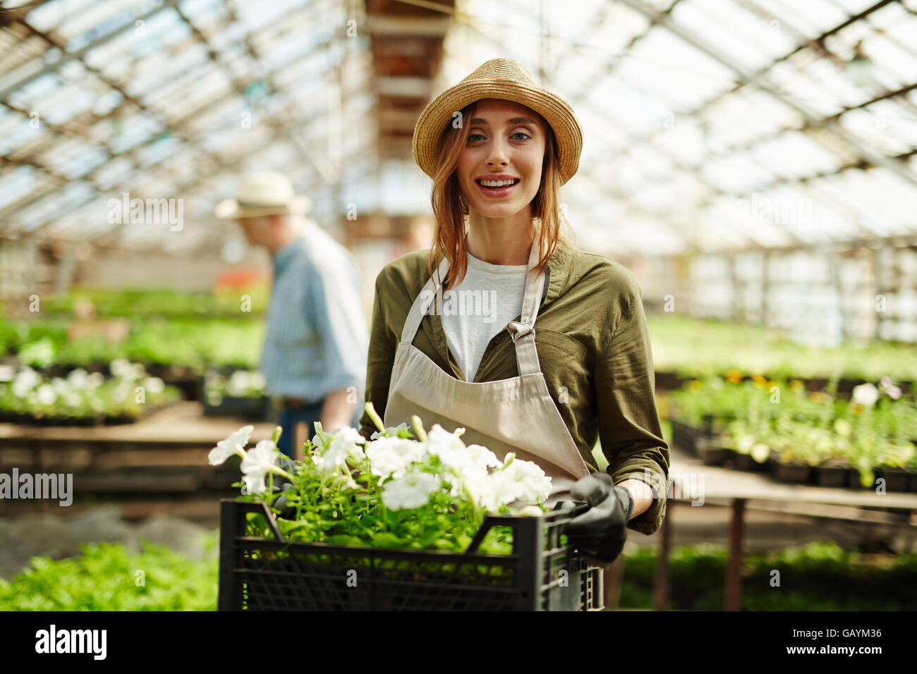 Girl with white flowers Stock Photo - Alamy