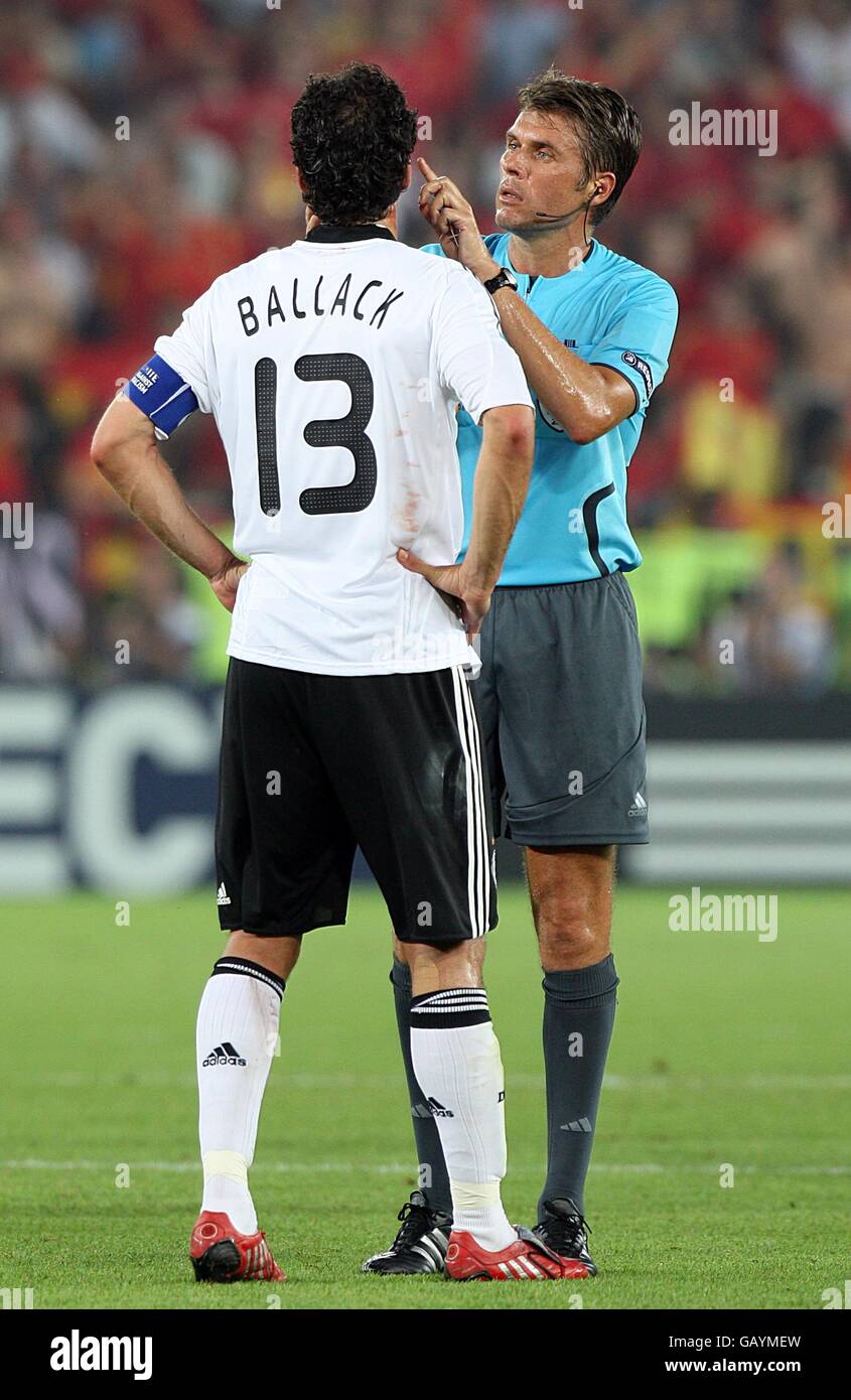 Referee Roberto Rosetti points out Michael Ballack's, Germany injury ...