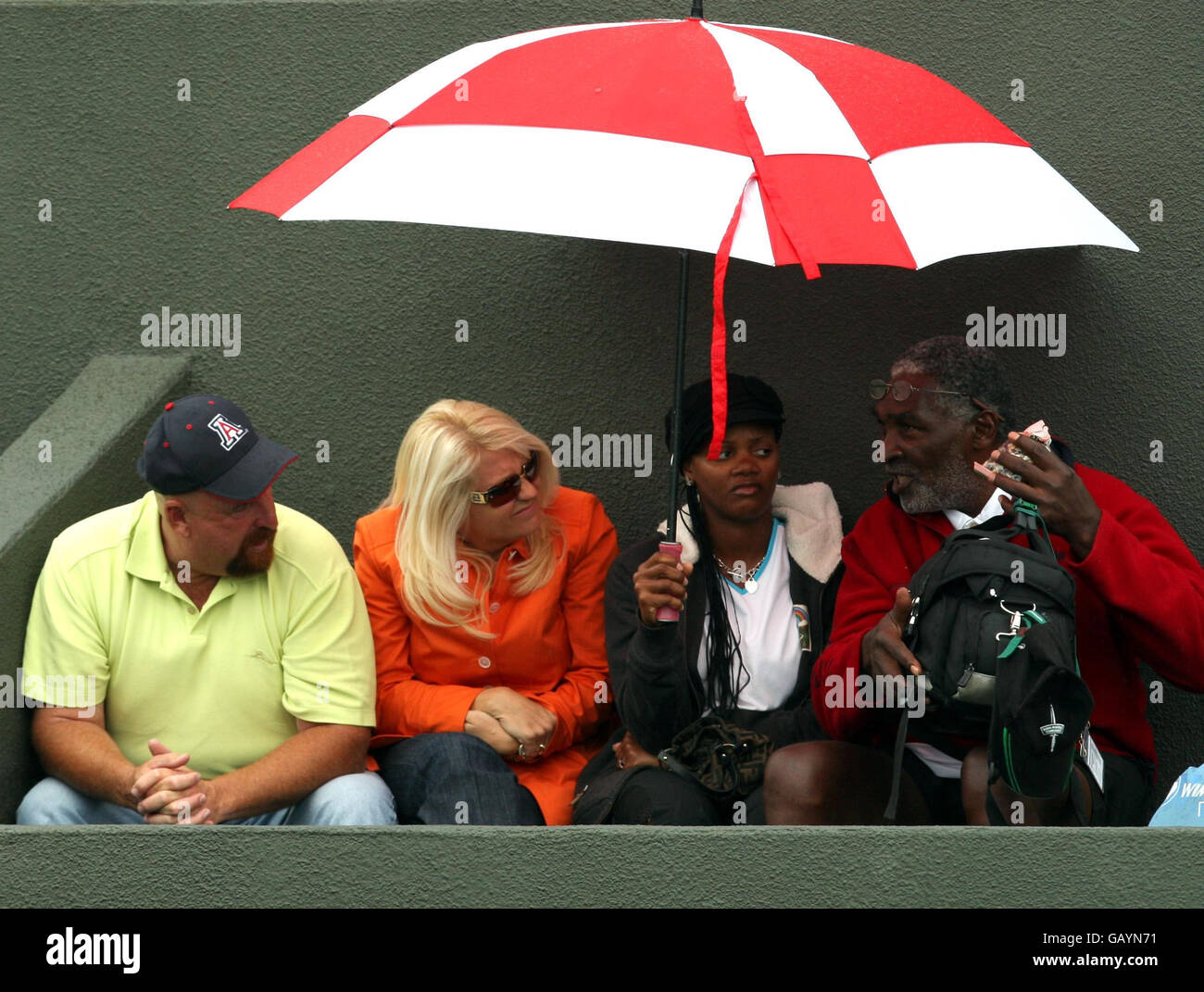 Richard Williams observes his daughters USA's Serena and Venus Williams ...