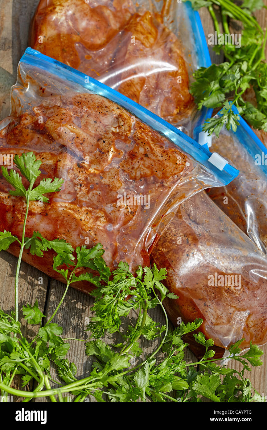 Marinated Meat pork and chicken with barbecue sauce Stock Photo - Alamy