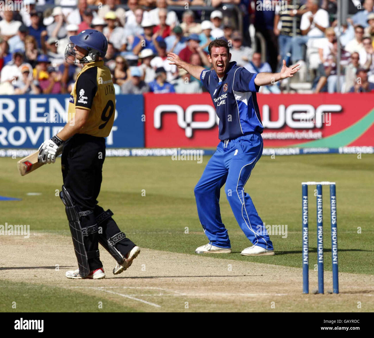 Essex's David Masters (right) celebrates LBW on Yorkshire's Adam Lyth ...