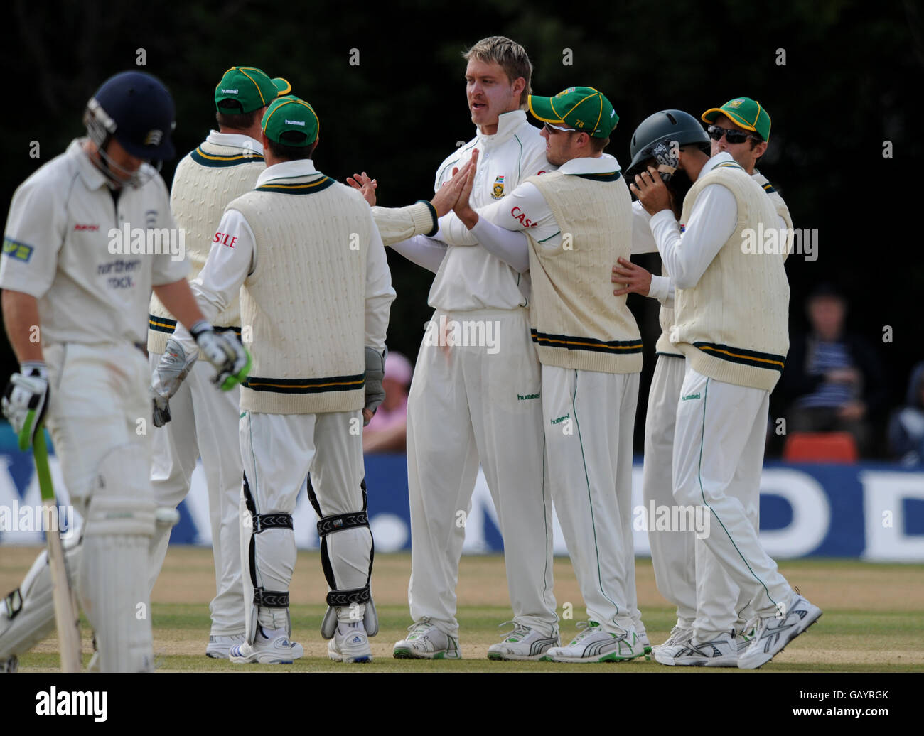 Middlesex's Ed Joyce walks off as South Africa's Paul Harris celebrates ...