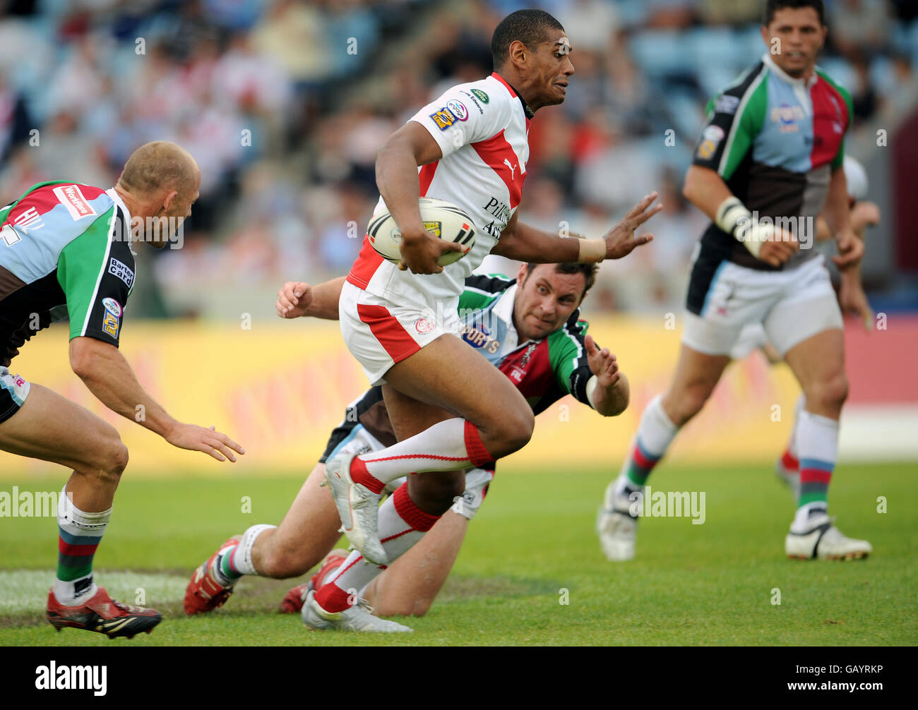 Harlequins rls haggerty is beaten by st helens leon pryce hi-res stock ...