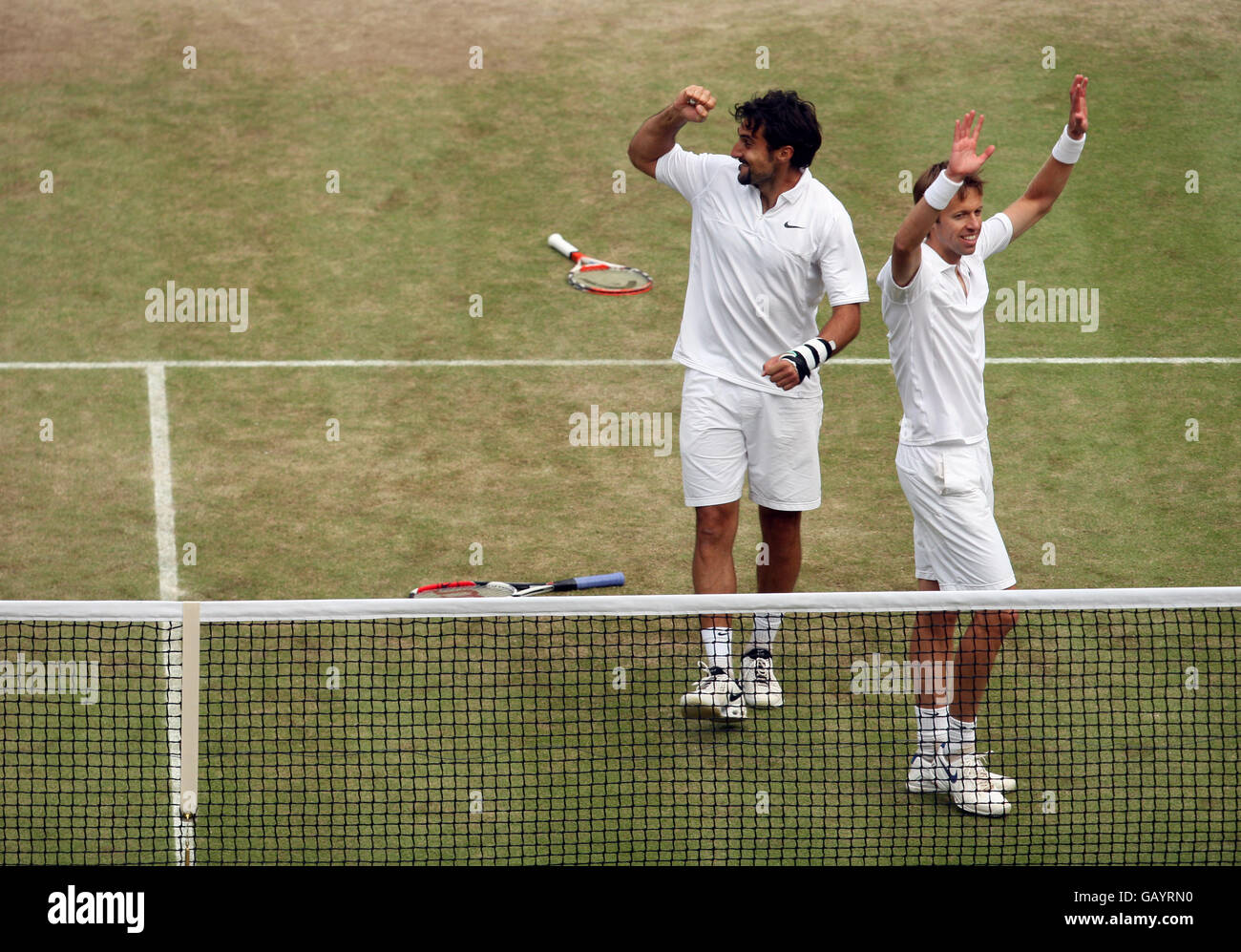 Daniel Nestor (right) and Nenad Zimonjic celebrate victory against ...