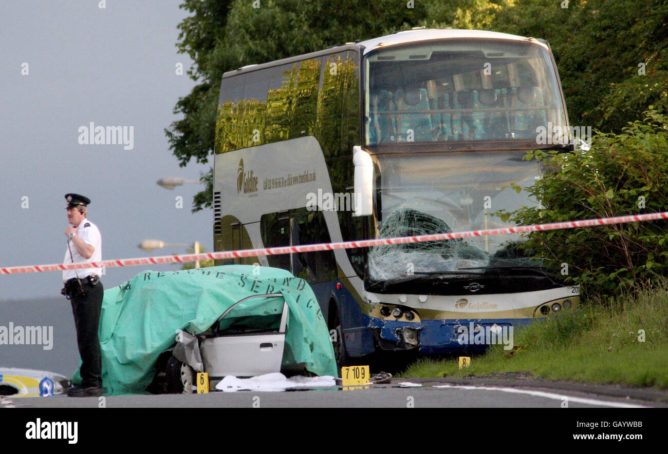 Two killed in bus and car crash Stock Photo - Alamy