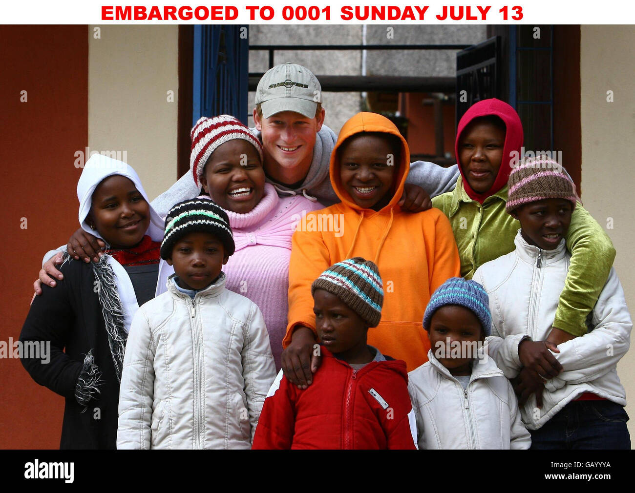 Prince Harry with children from the Lesotho Child Counselling Unit in ...