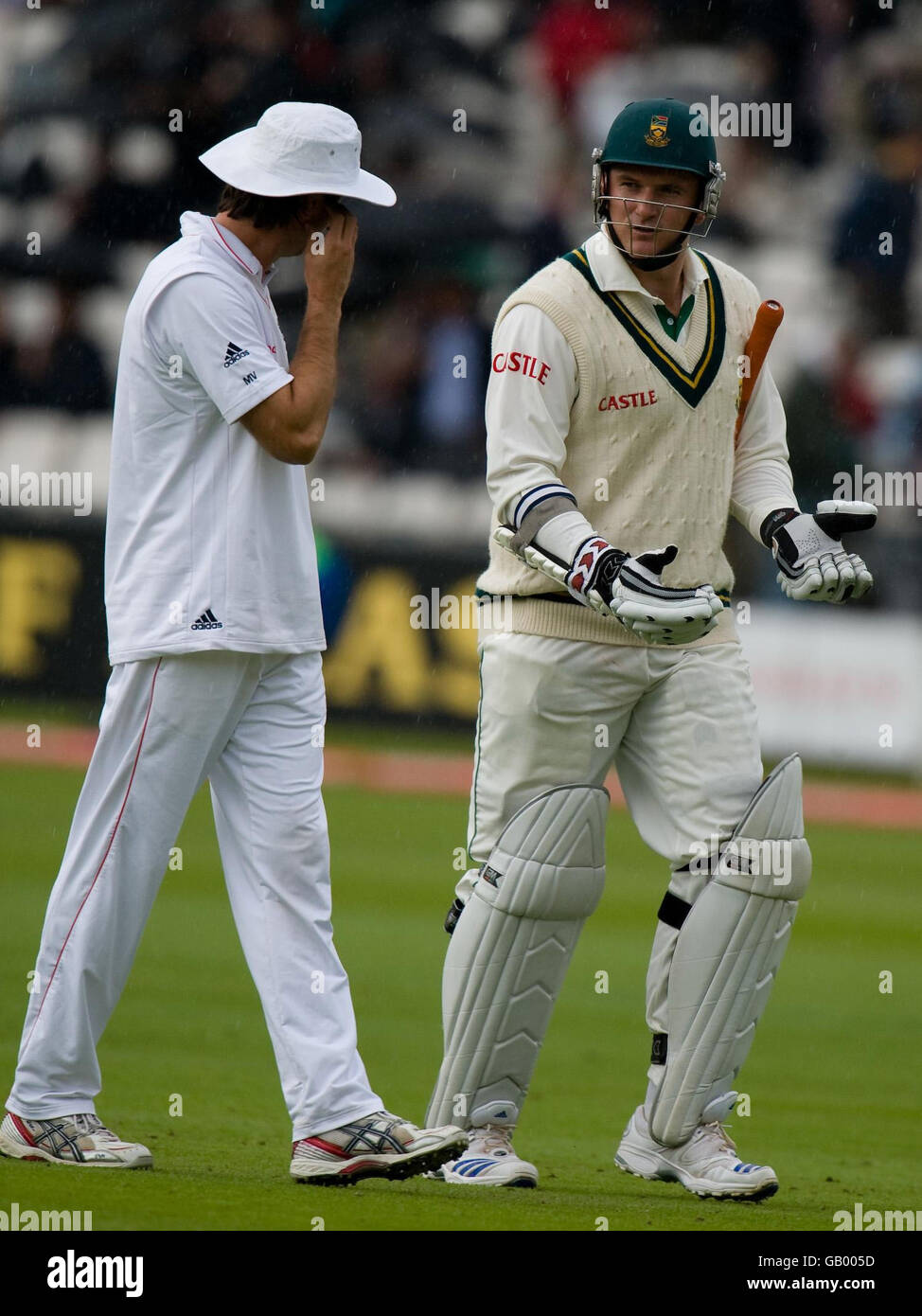 South African captain Graeme Smith talks to England captain Michael ...