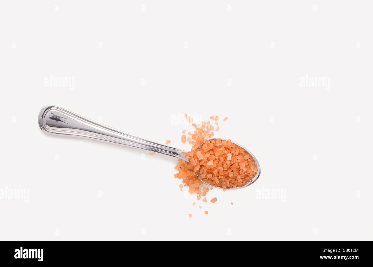 A spoonful of Red Alaea Salt from Hawaii, an unrefined sea salt mixed ...