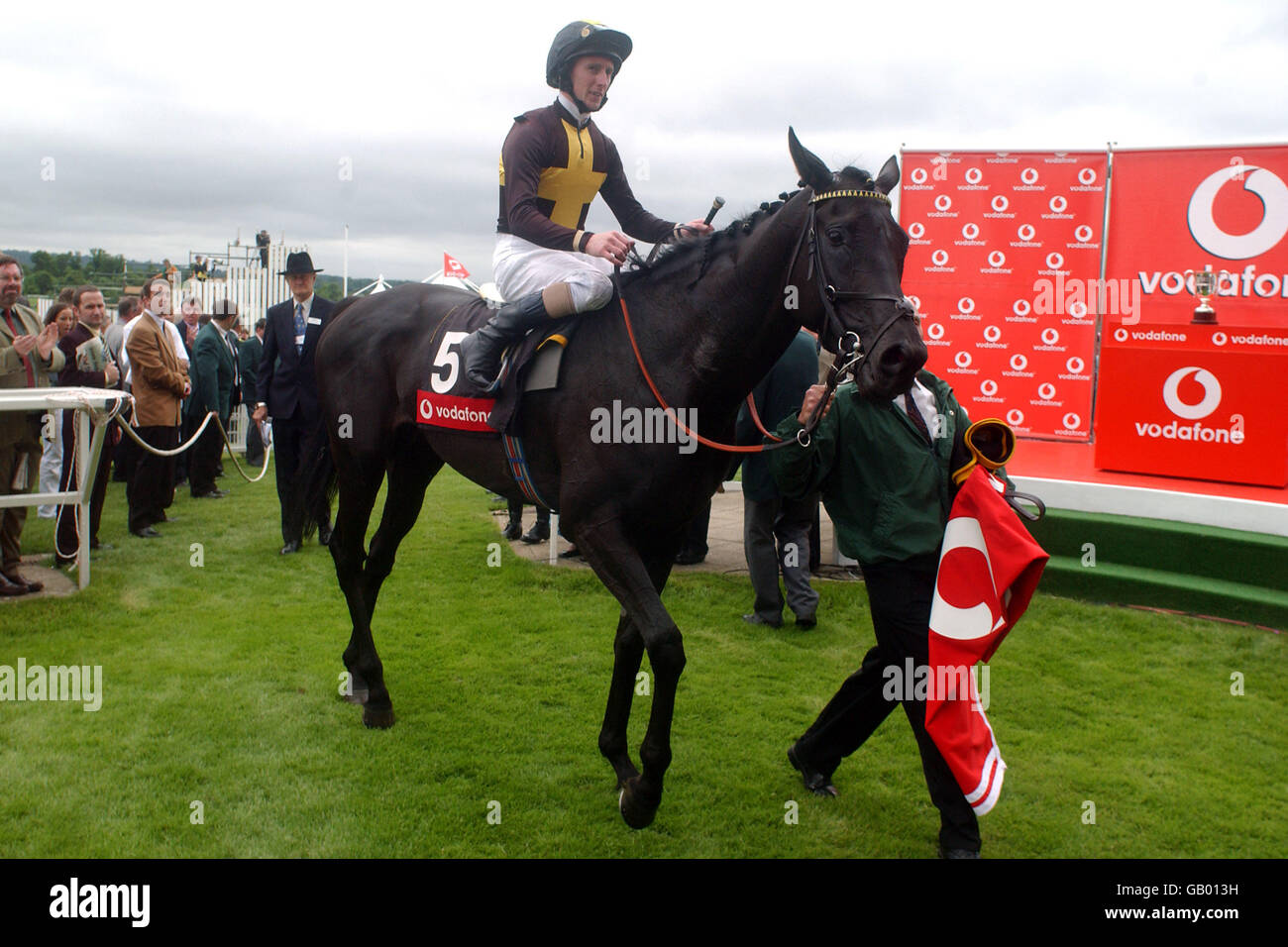 Jockey Martin Dwyer on Passing Glance enters the winning enclosure ...