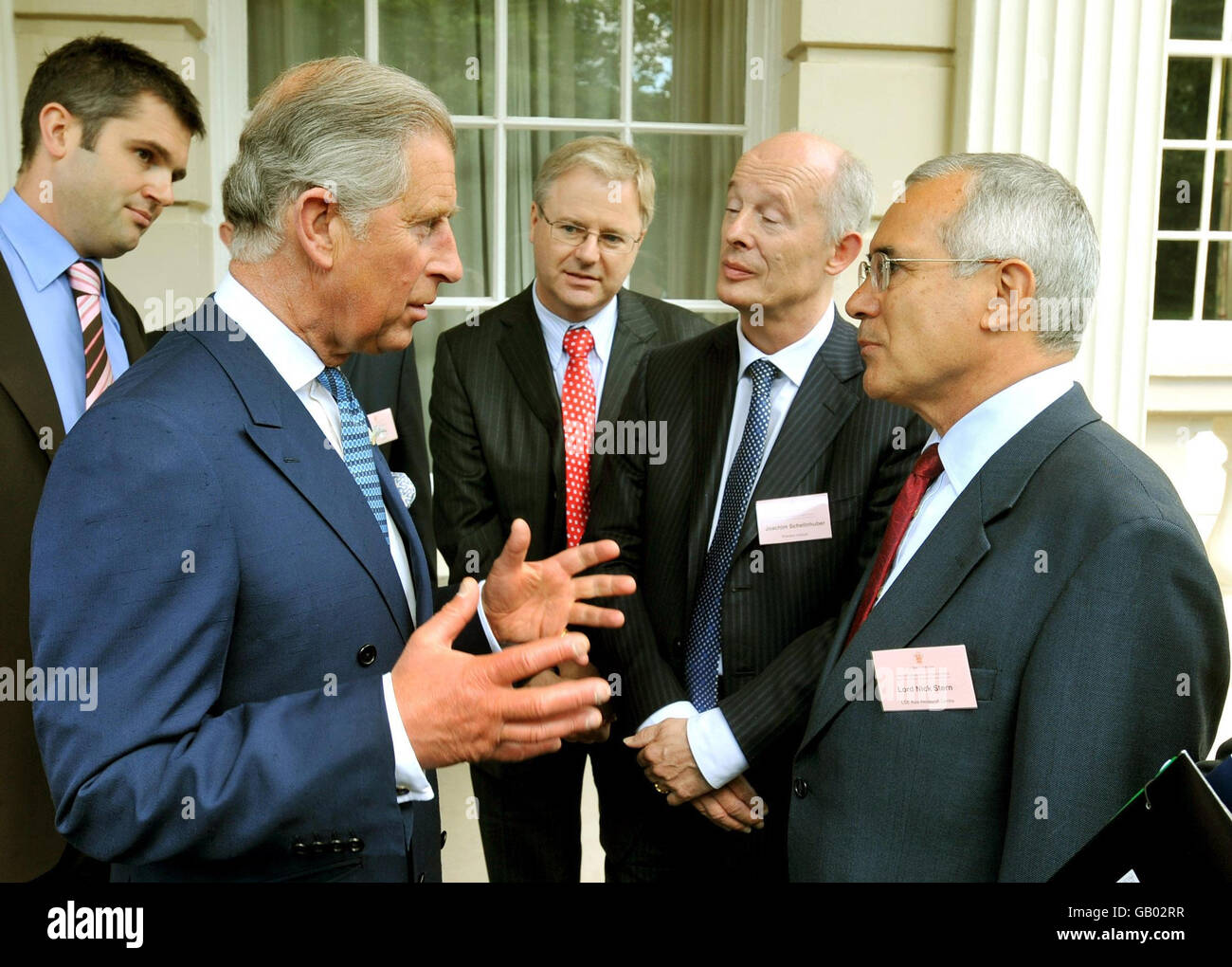 The Prince of Wales speaks with Lord Nicholas Stern (right) before the ...