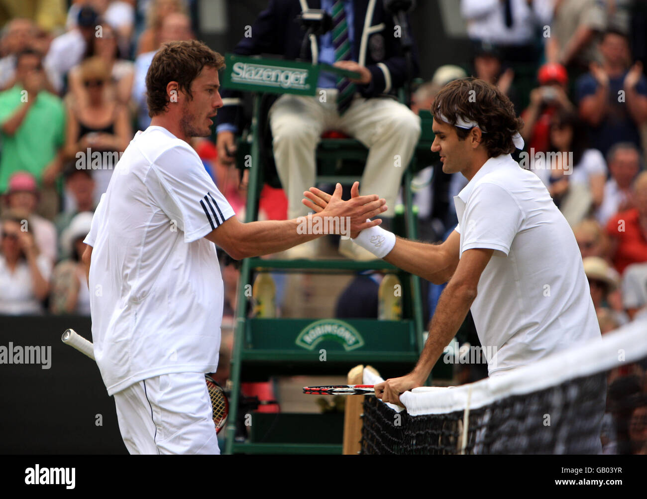 Roger federer shakes hands with marat safin left after victory hi-res ...