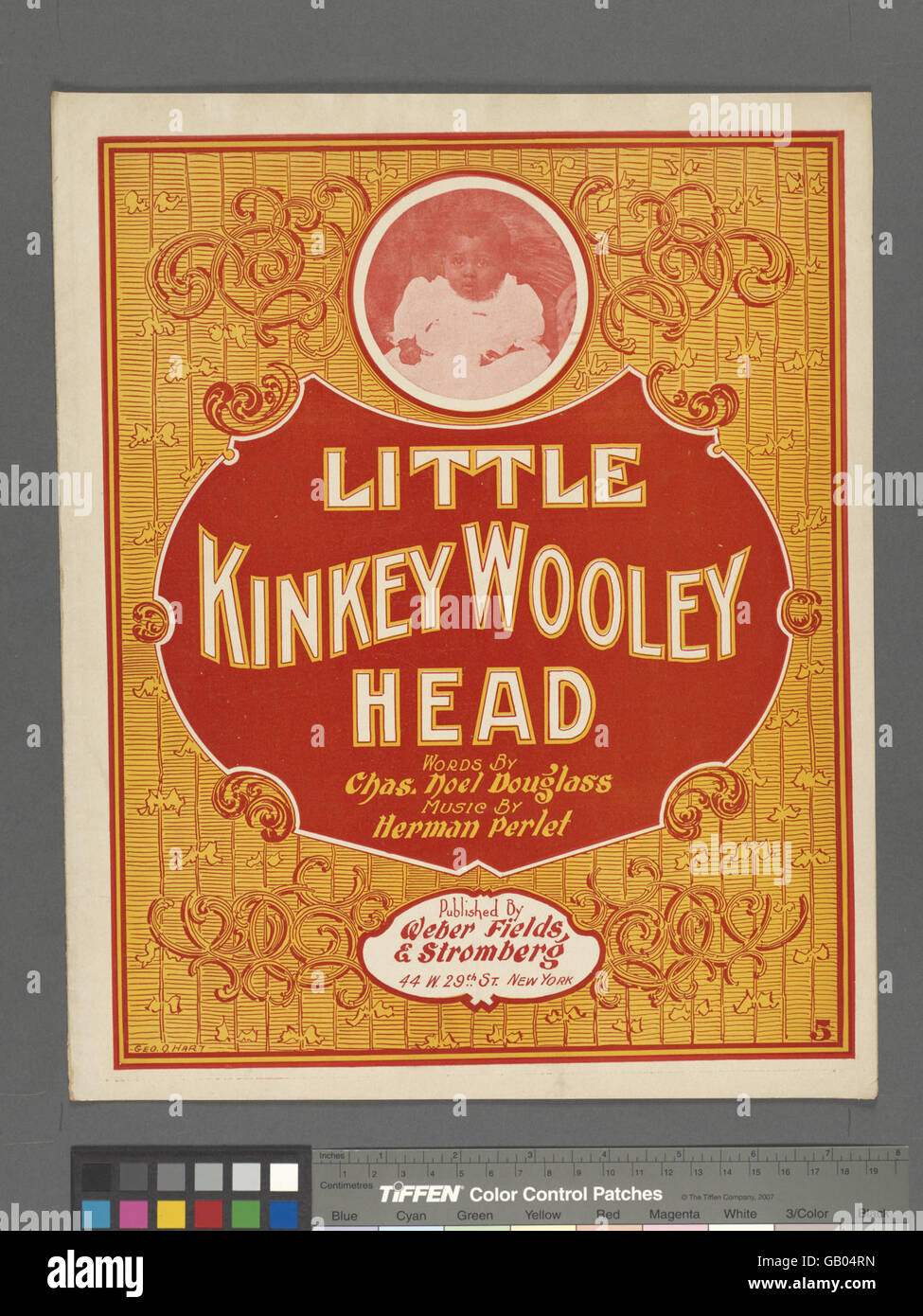 ‘Little Kinkey wooley head’ likely refers to a playful or affectionate ...