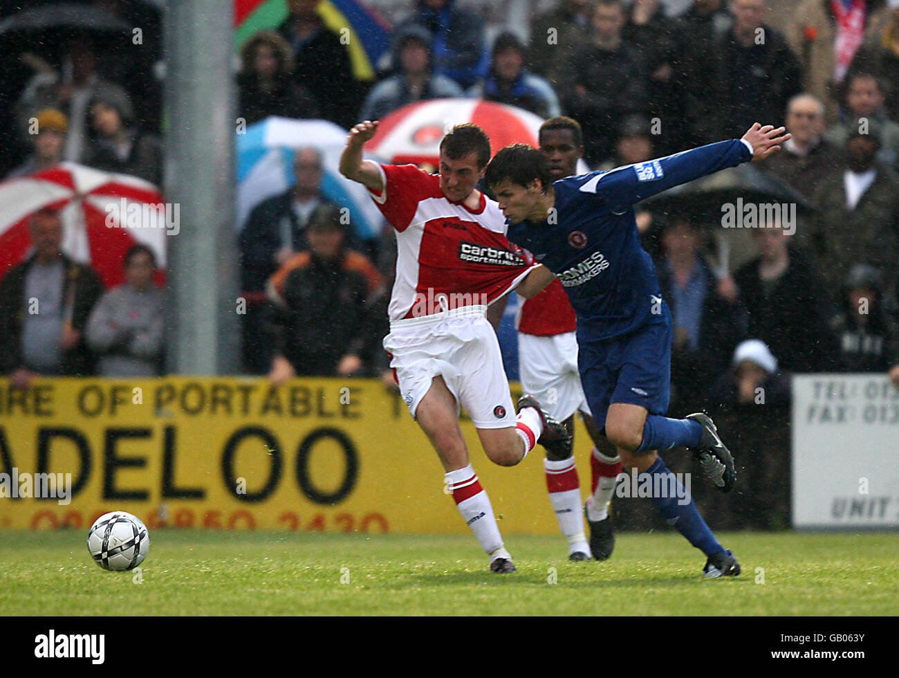 Welling United's Charlie Sheringham and Charlton Athletic's Sam Long ...