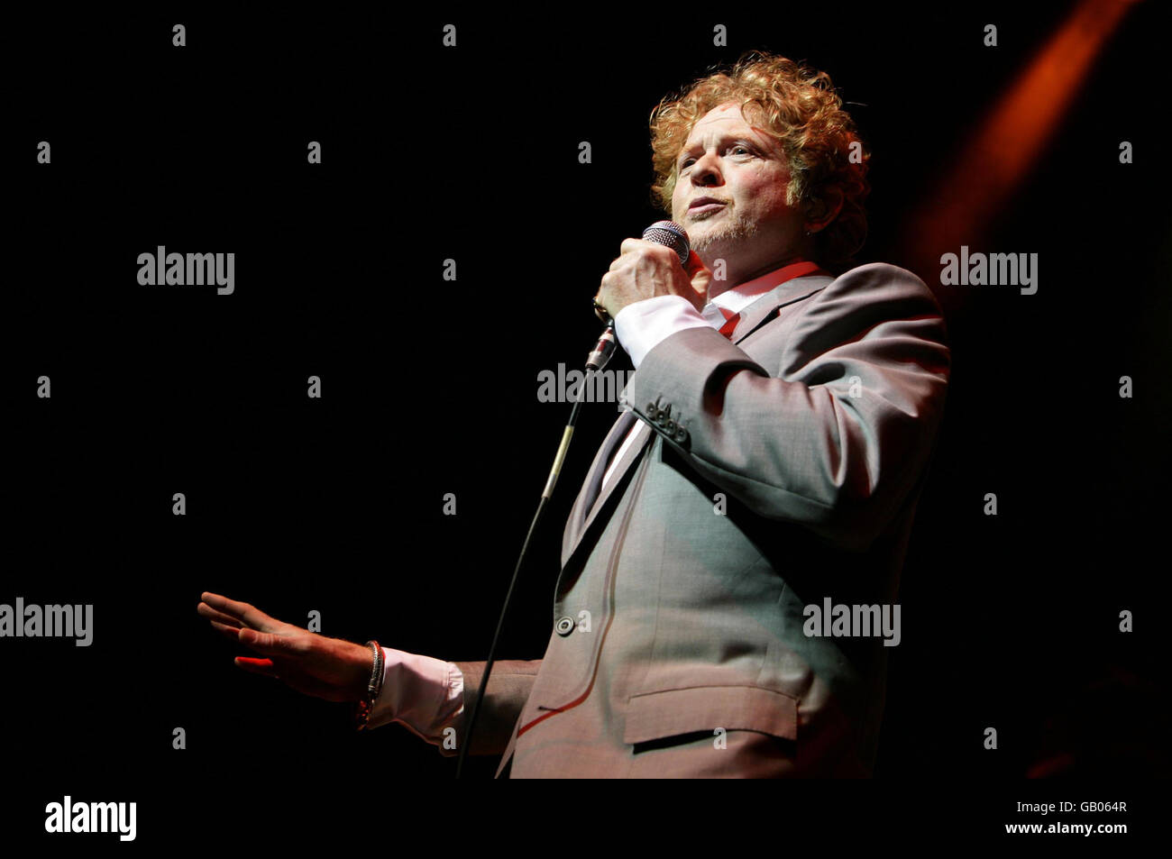 British singer mick hucknall performs hi-res stock photography and ...