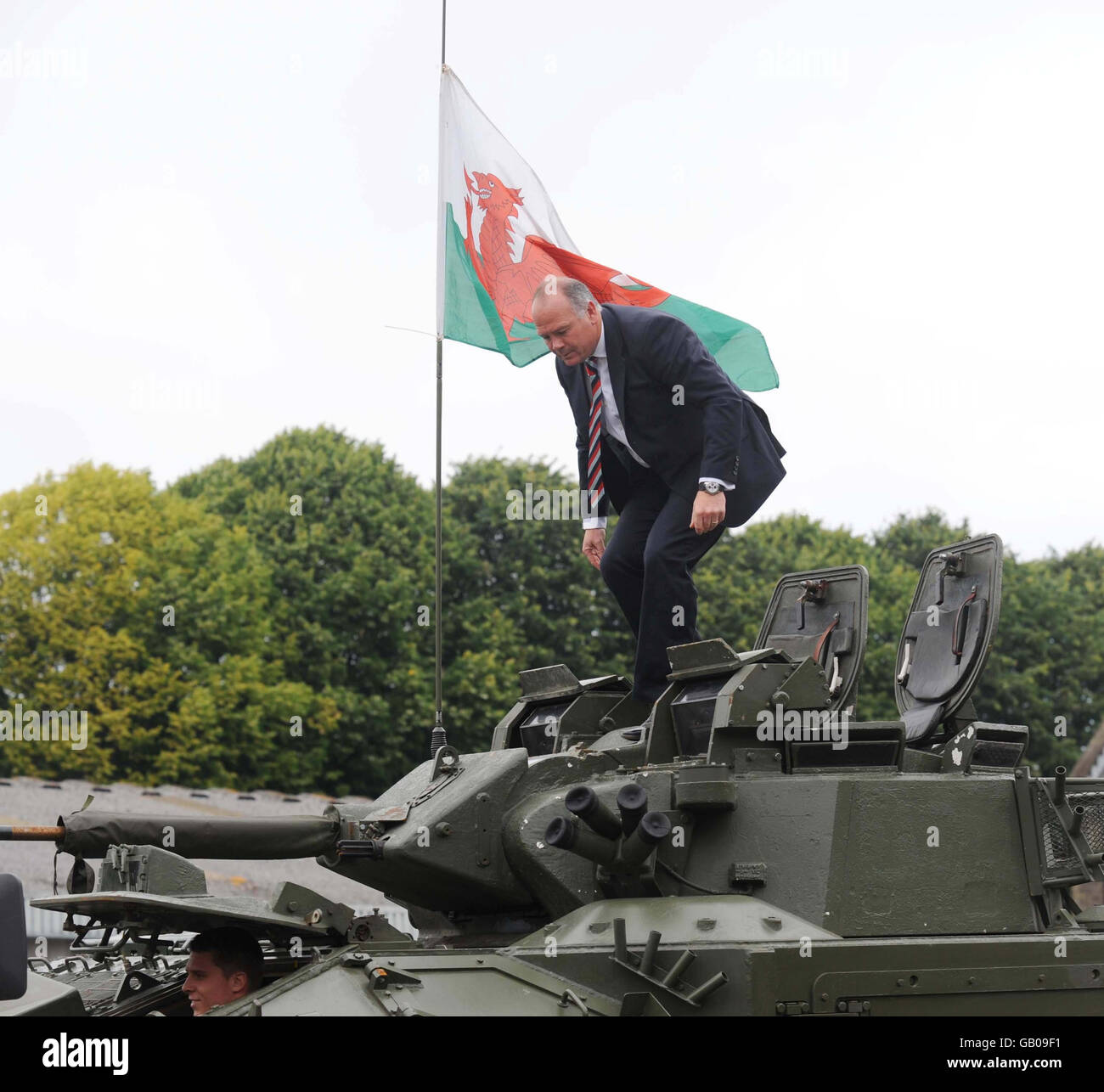Welsh Rugby legend Ieuan Evans climbs from the Warrior Armoured ...