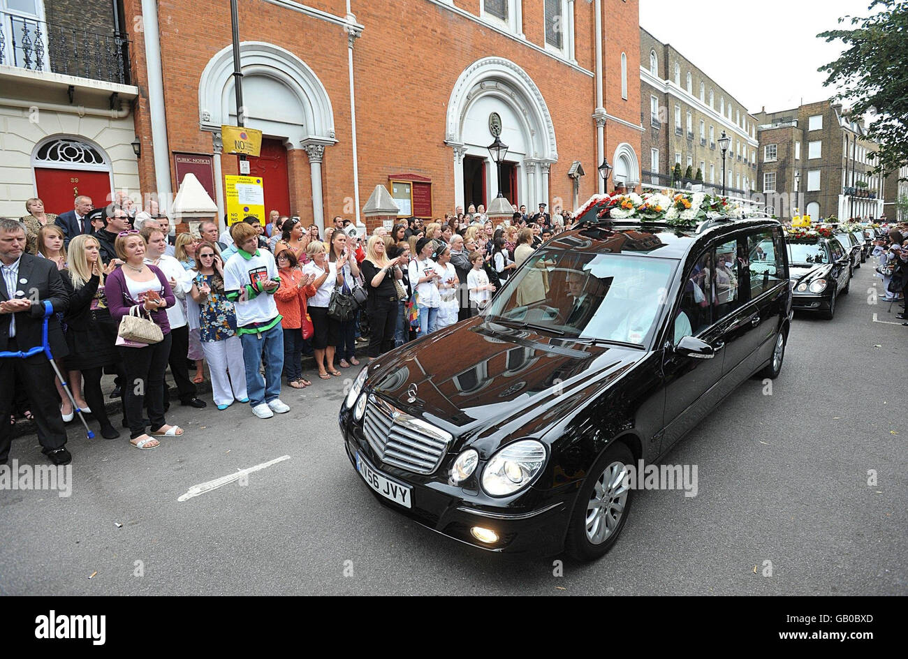 The funeral procession leaves the St. John's the Evangelist Roman ...