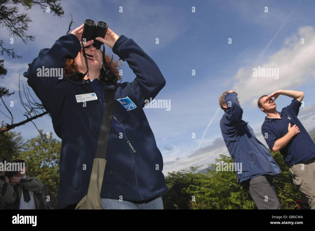 RSPB staff and birdwatchers look on as the RSPB Northern Ireland ...