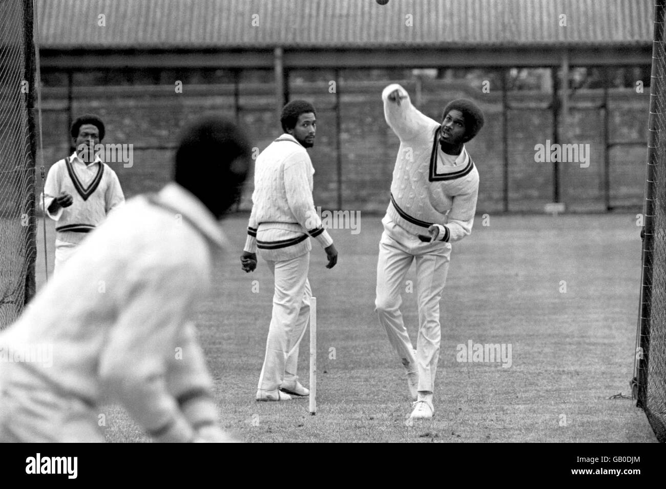 West Indies' Andy Roberts (c) looks on as teammate Michael Holding (r ...