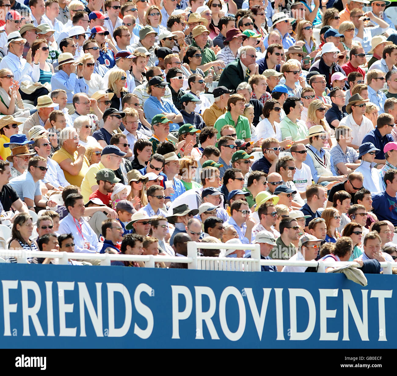 General view of the crowd watching the cricket from the hi-res stock ...