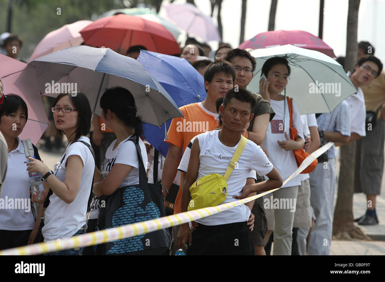 People queue for tickets for the 2008 Olympic Games in Beijing, China ...